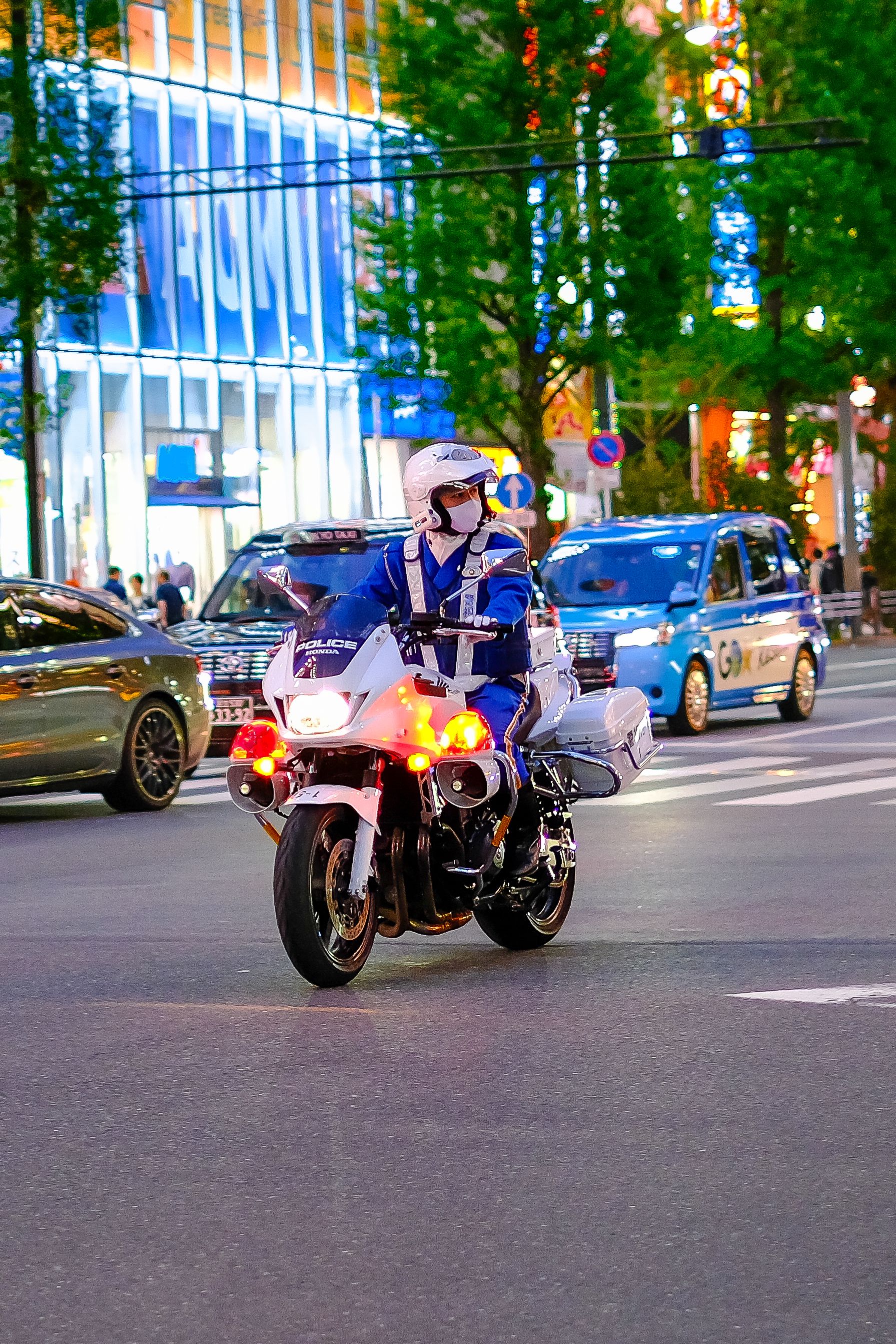 Police Officer on Motorcycle in Tokyo City Night · Free Stock Photo