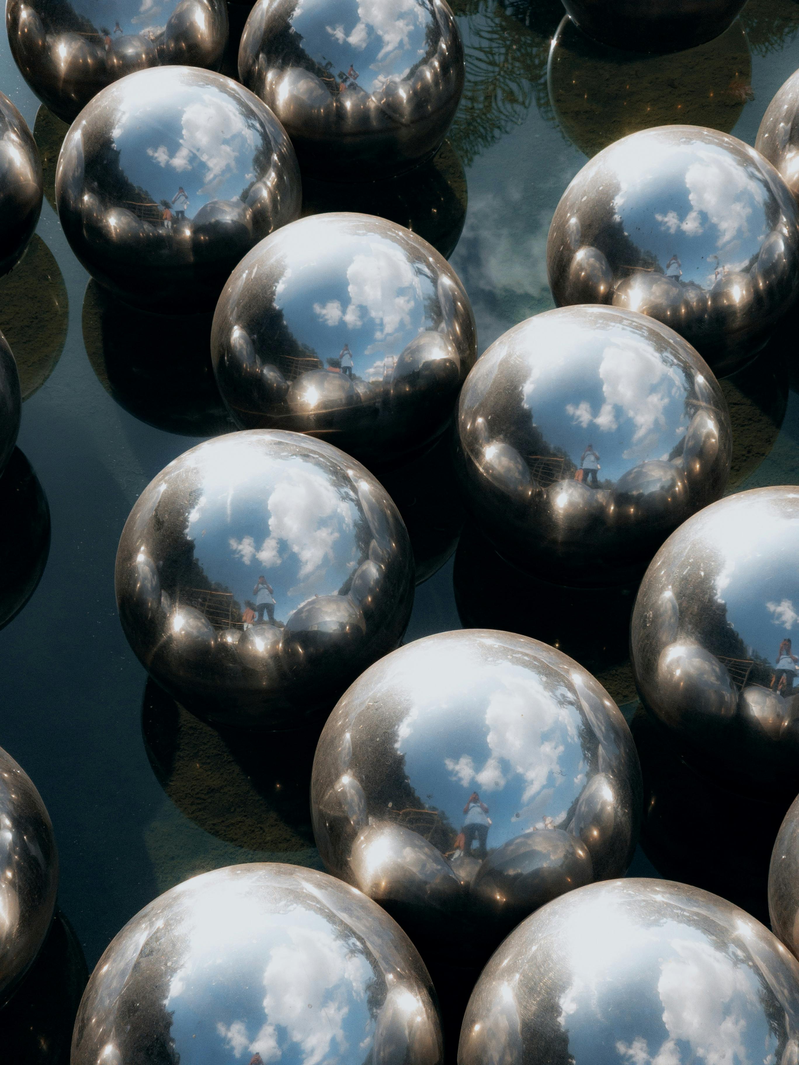 Reflective Metal Spheres at Outdoor Art Installation · Free Stock Photo