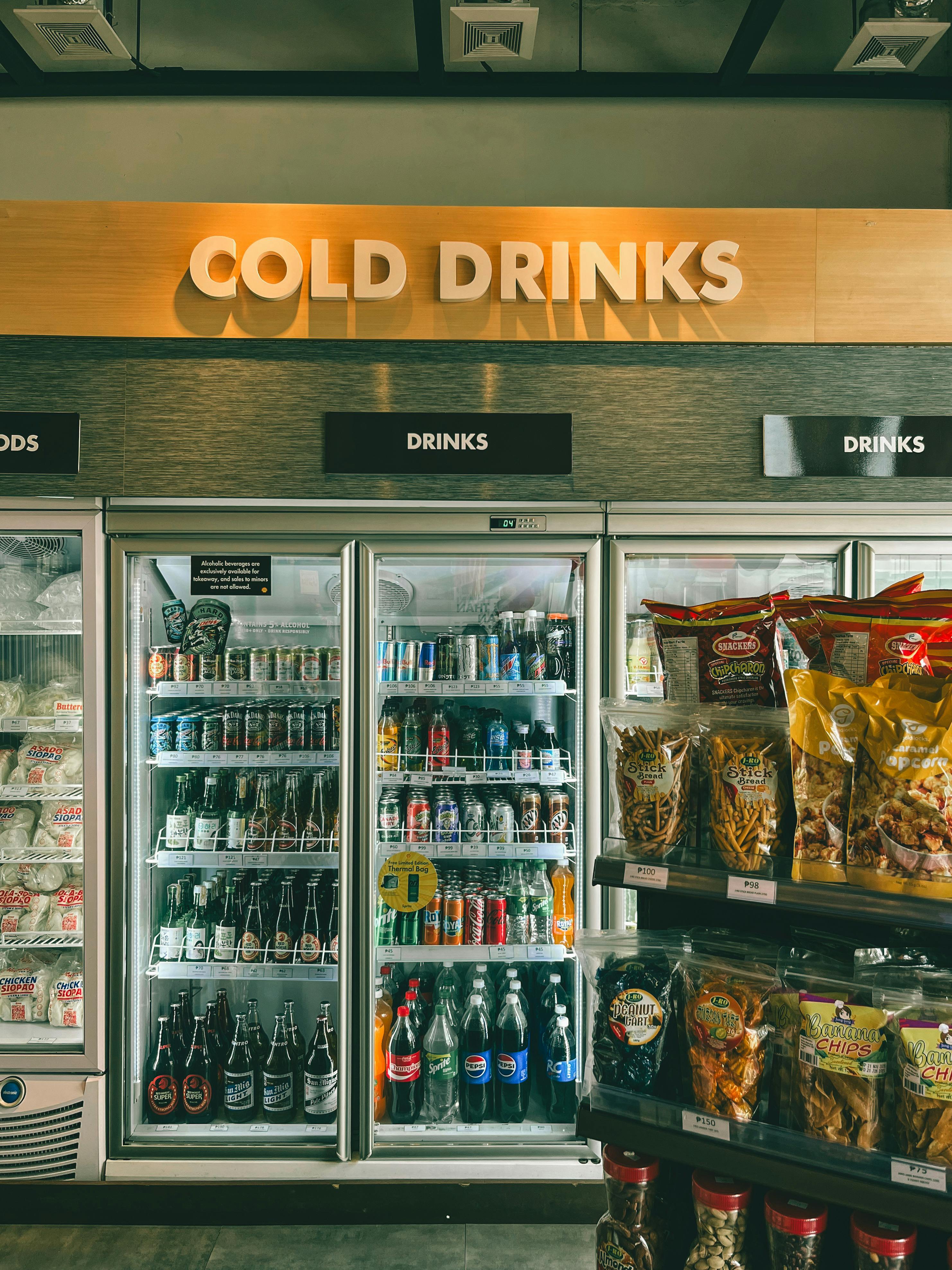 Fully Stocked Convenience Store Beverage Aisle · Free Stock Photo