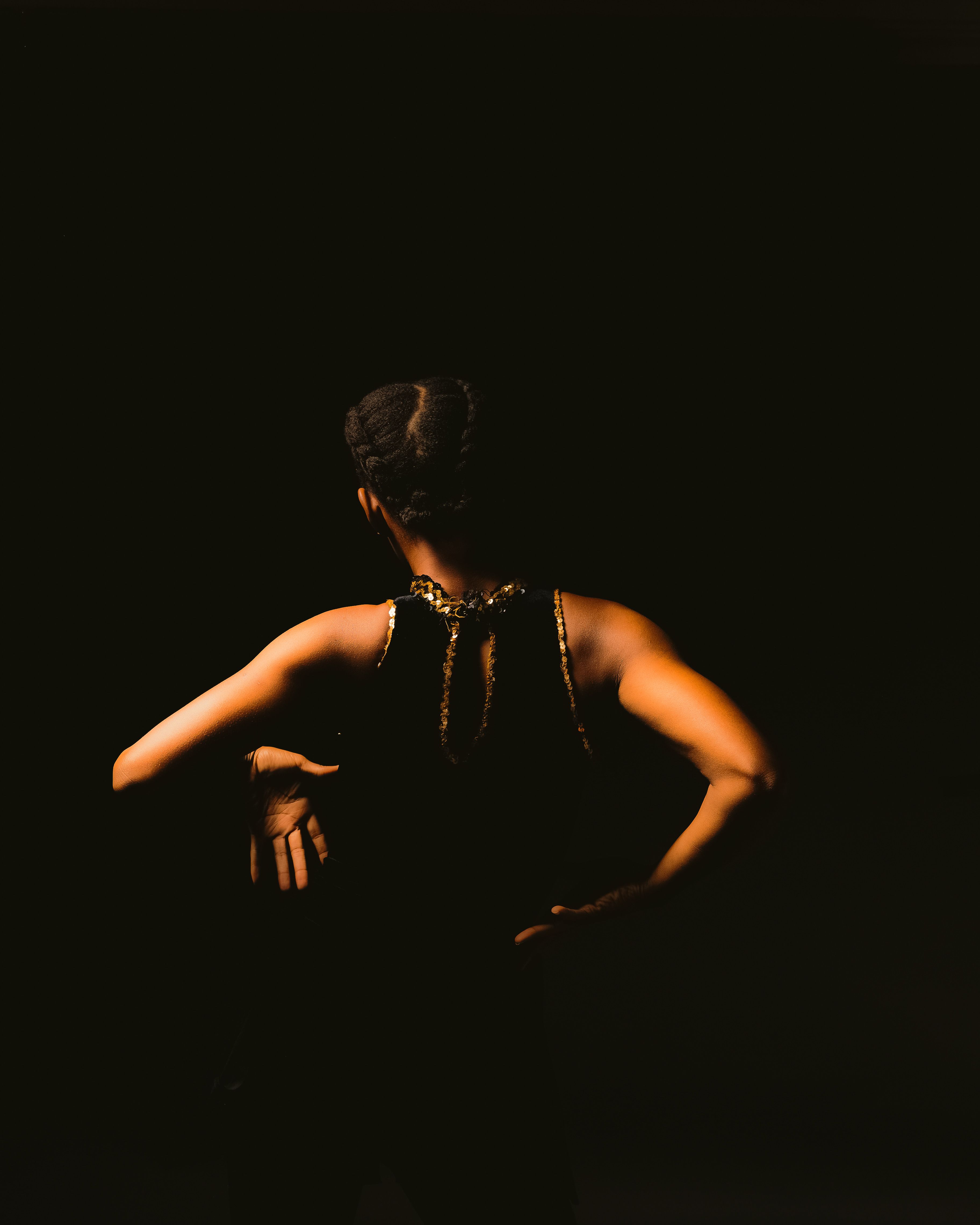 Artistic Portrait of Woman in Dim Lighting · Free Stock Photo