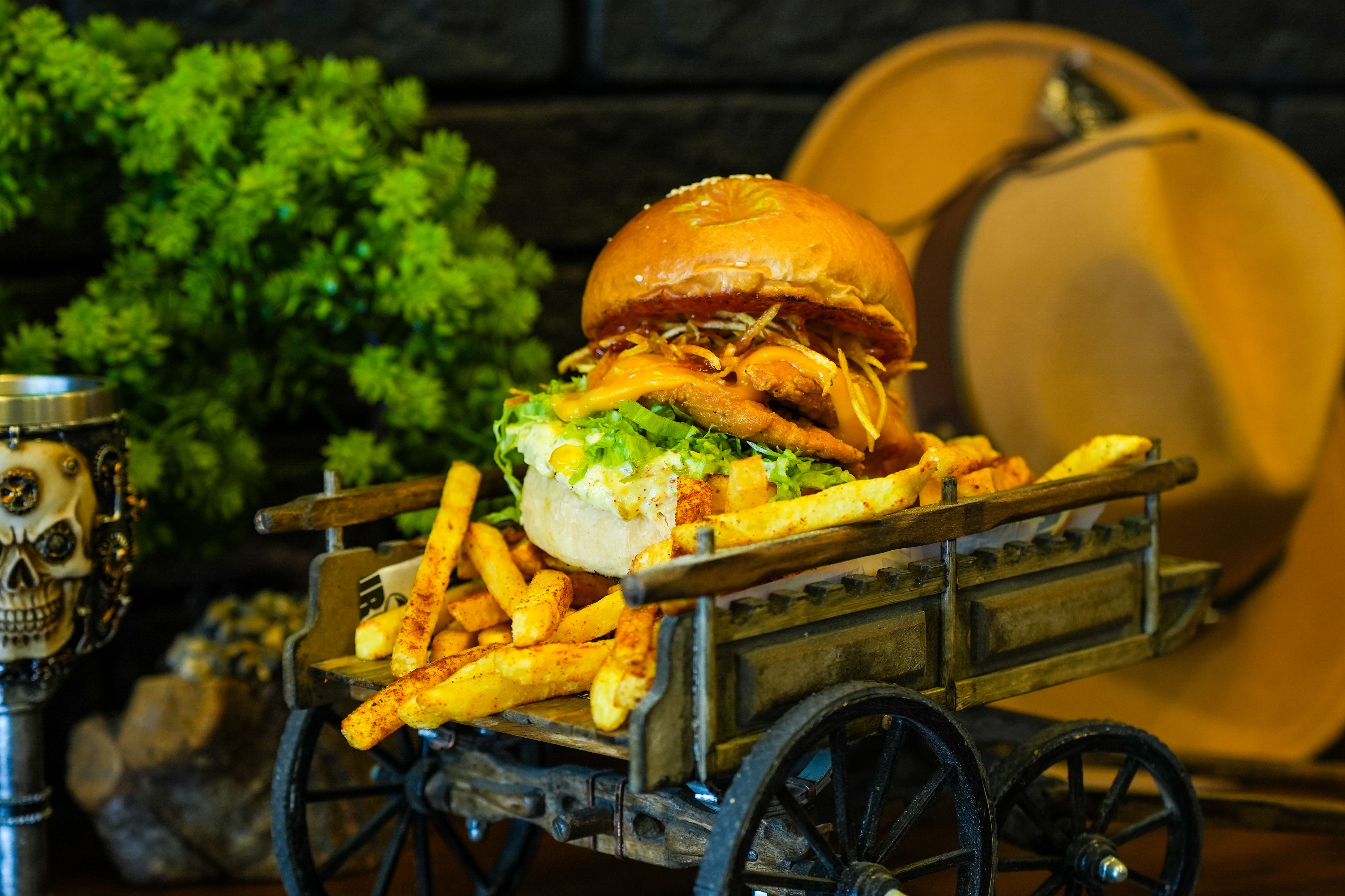 Gourmet Burger and Fries on Mini Wagon Display · Free Stock Photo