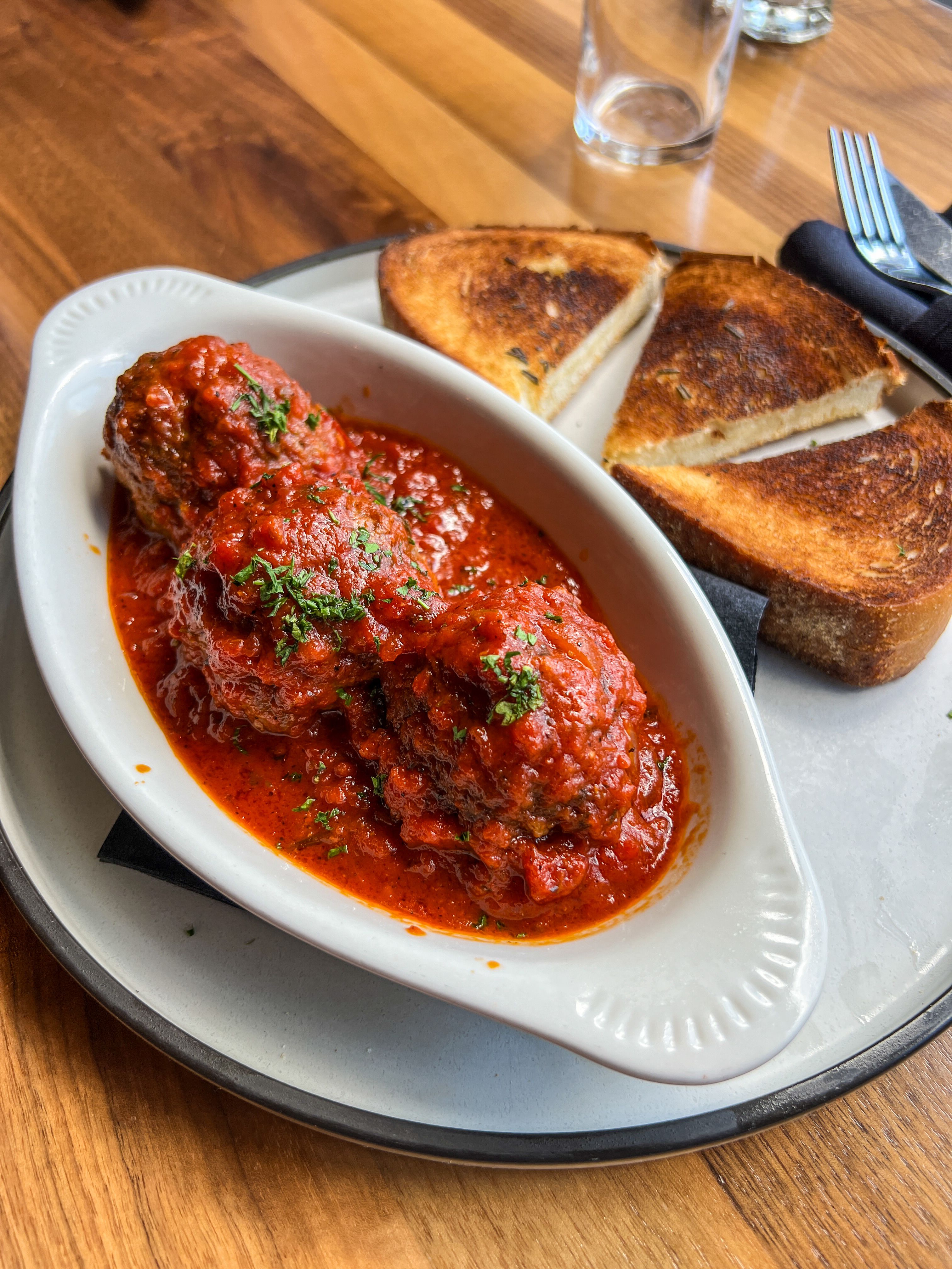 Delicious Meatballs in Tomato Sauce with Toast · Free Stock Photo