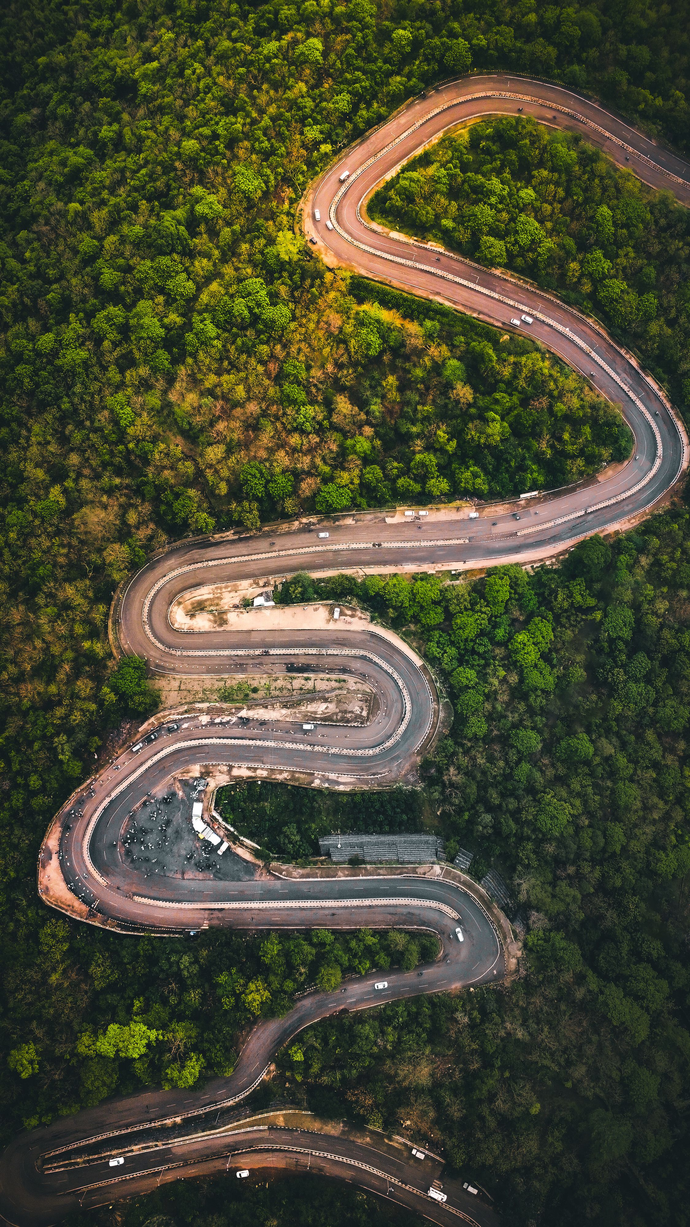 Aerial View of Road in the Middle of Trees · Free Stock Photo