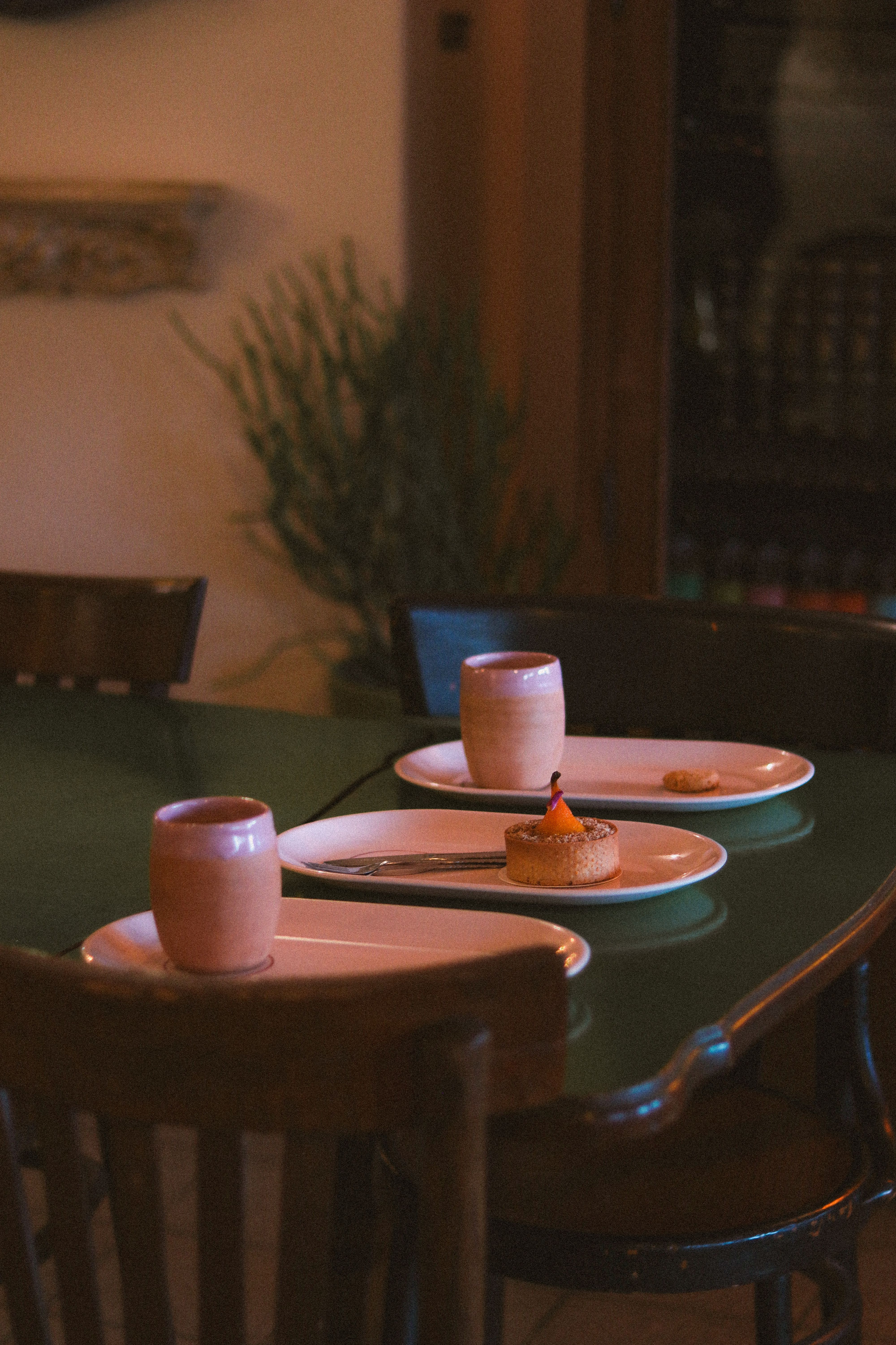 Cozy Café Table Setting with Warm Lighting · Free Stock Photo