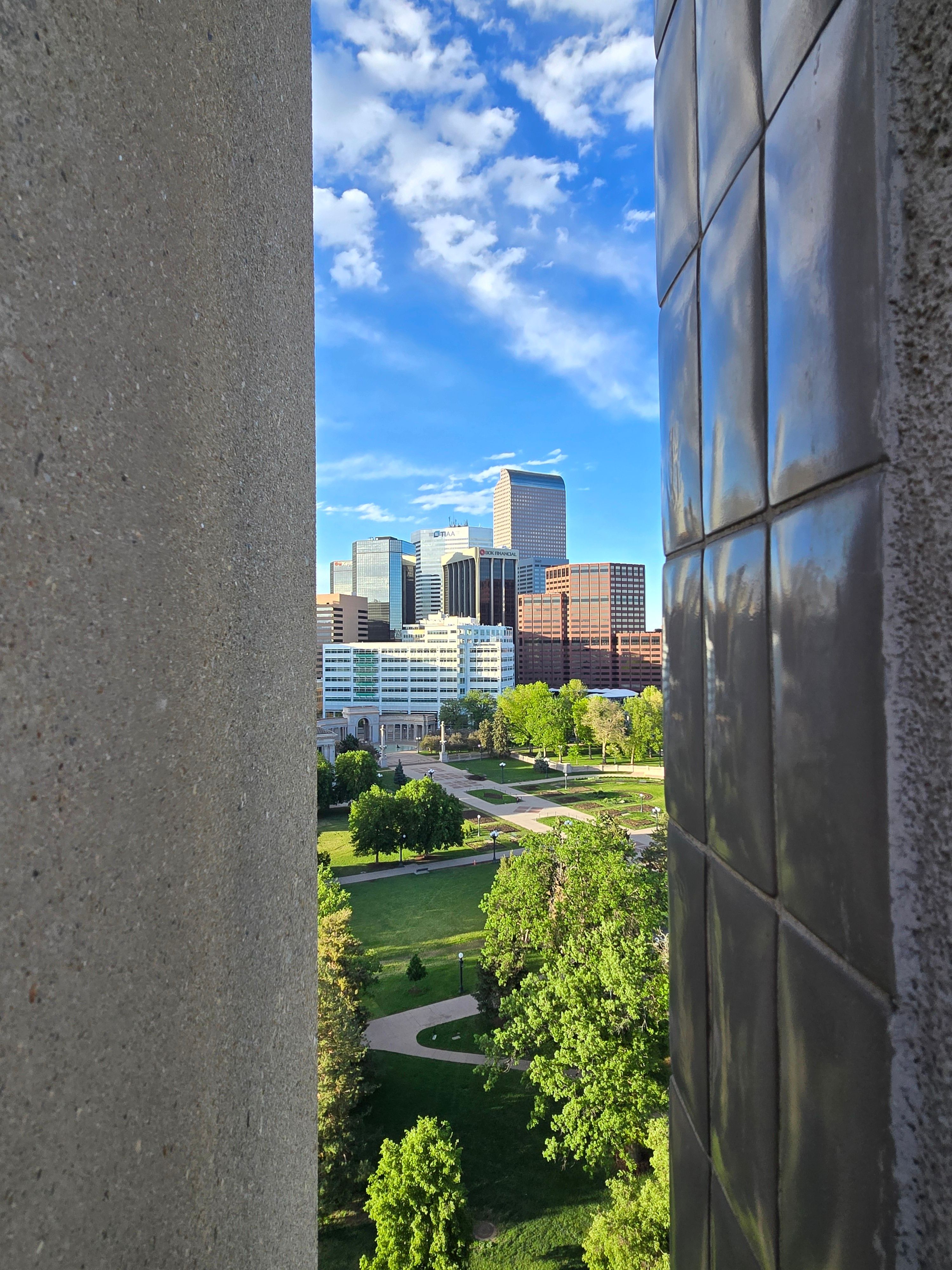 View of City Skyline Framed by Buildings · Free Stock Photo