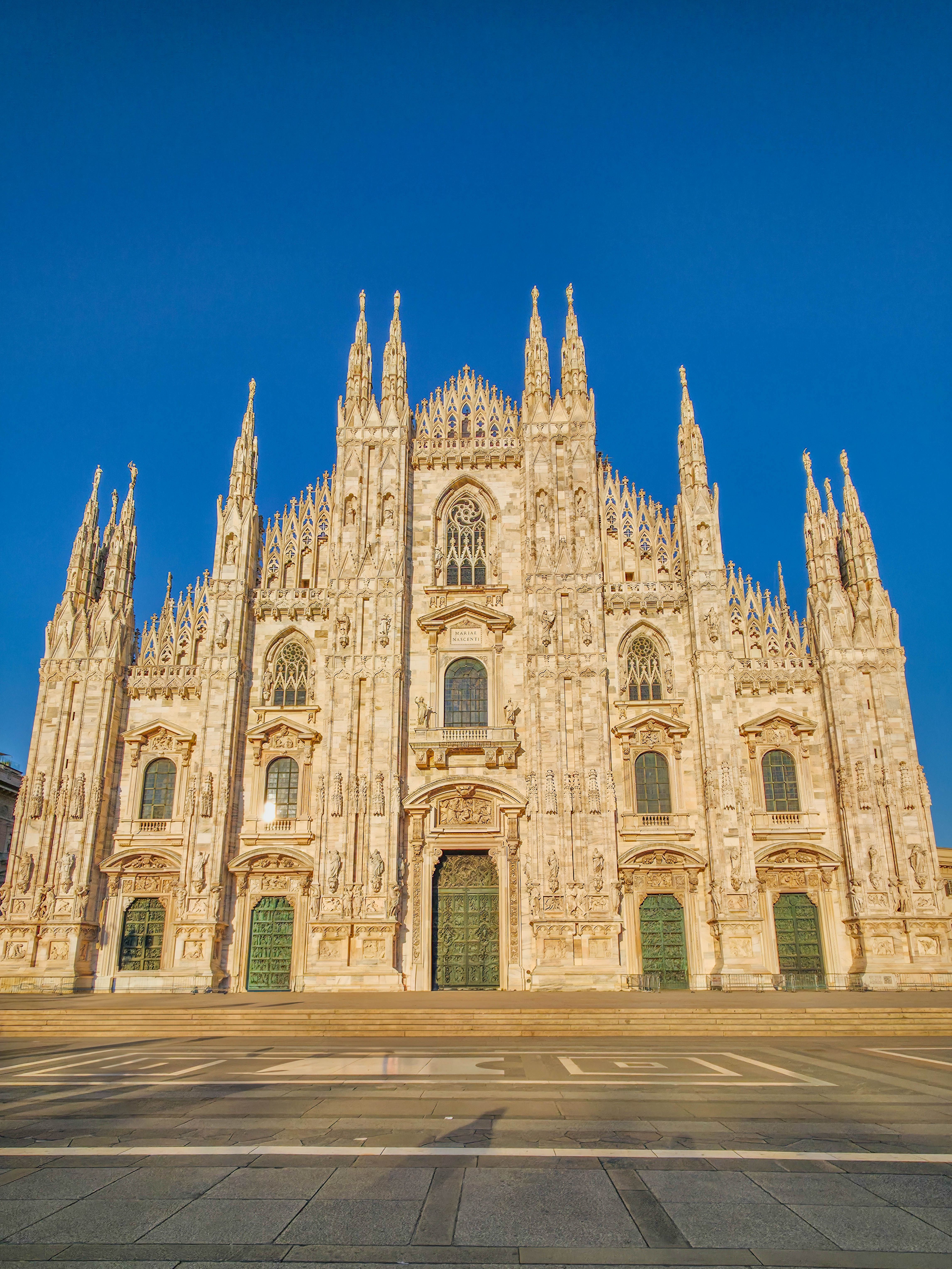 Majestic Duomo di Milano Facade at Sunrise · Free Stock Photo