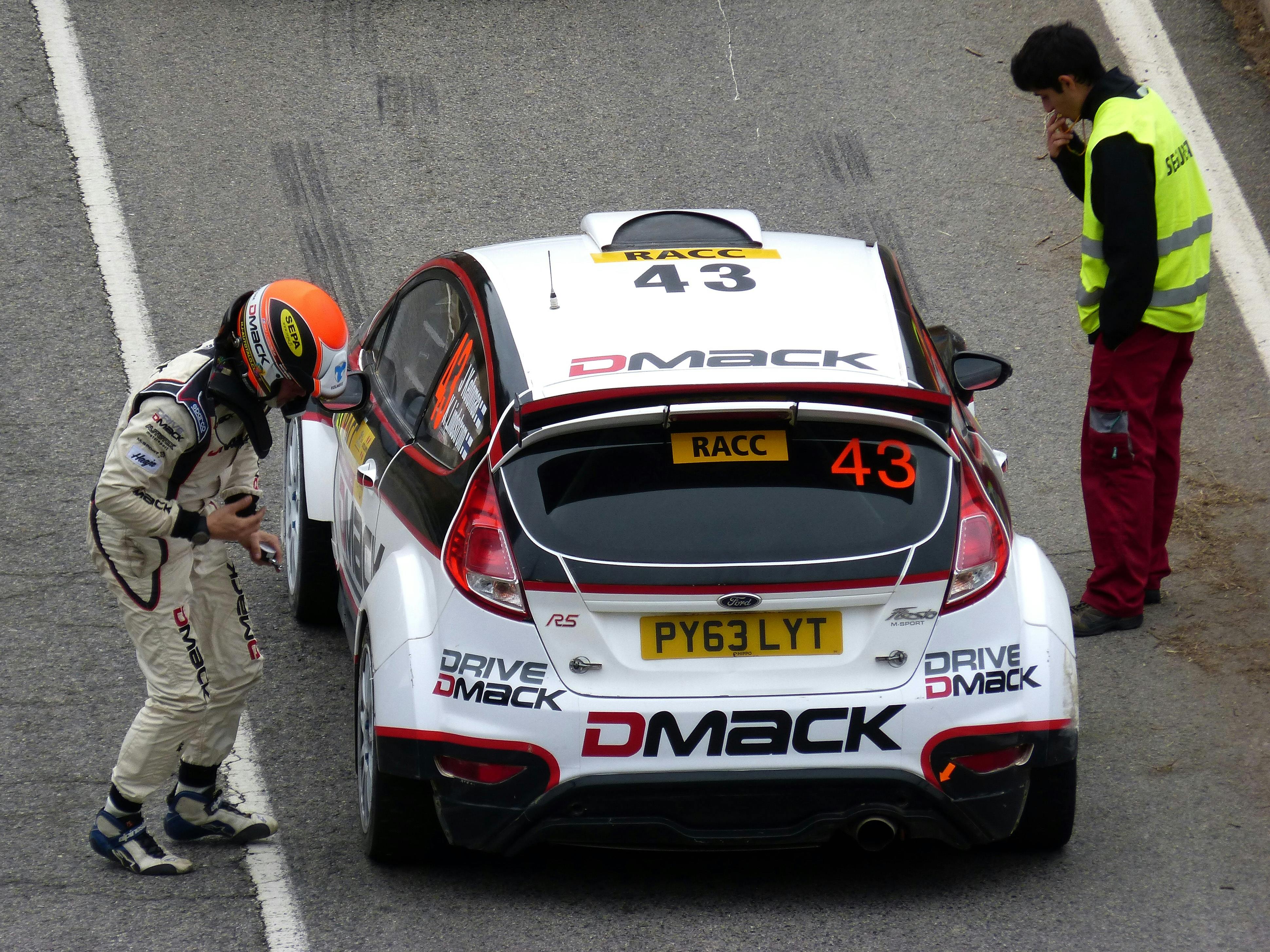 50+ Engaging Pit Crew Photos · Pexels · Free Stock Photos