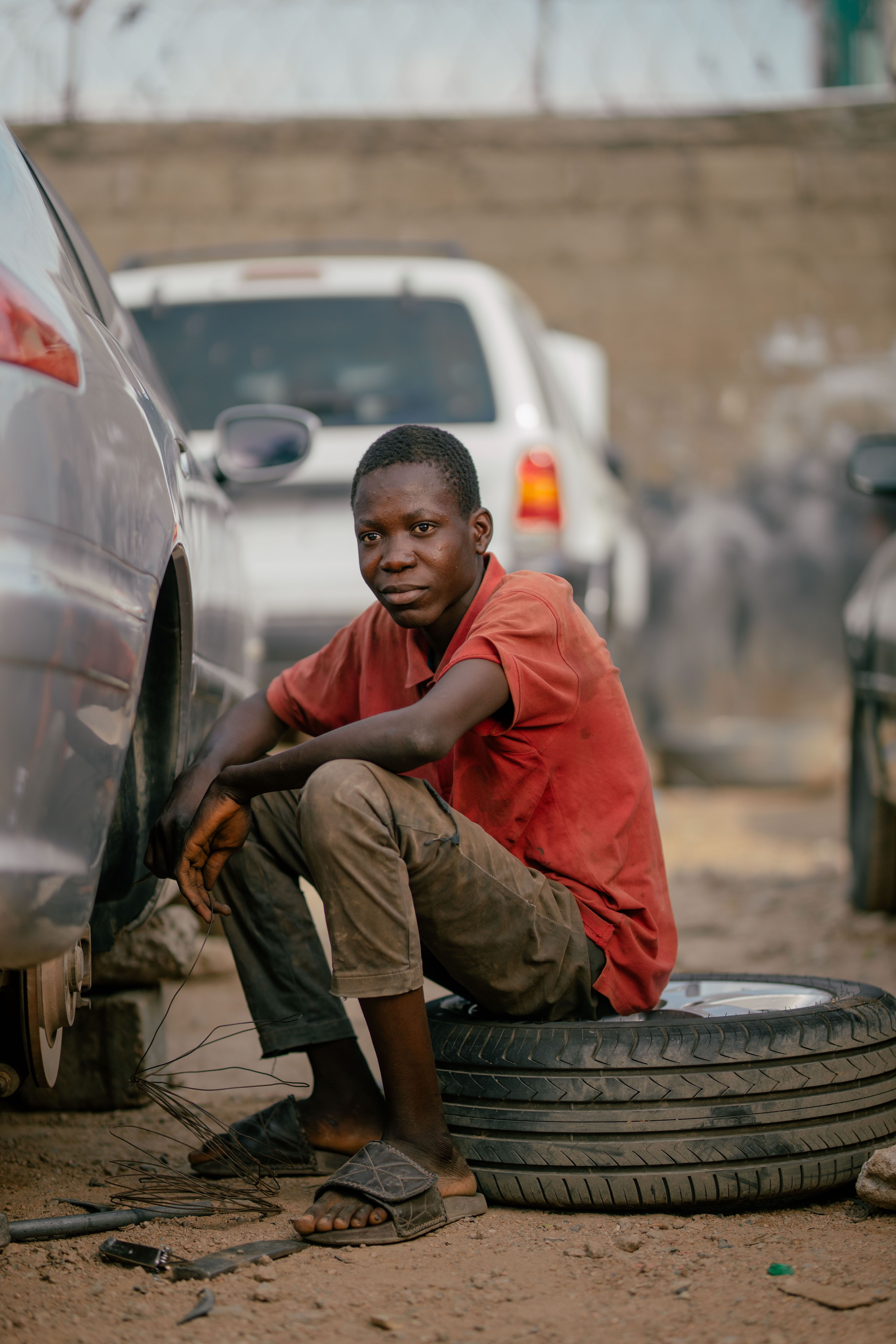Young Mechanic Fixing Car Outdoors · Free Stock Photo