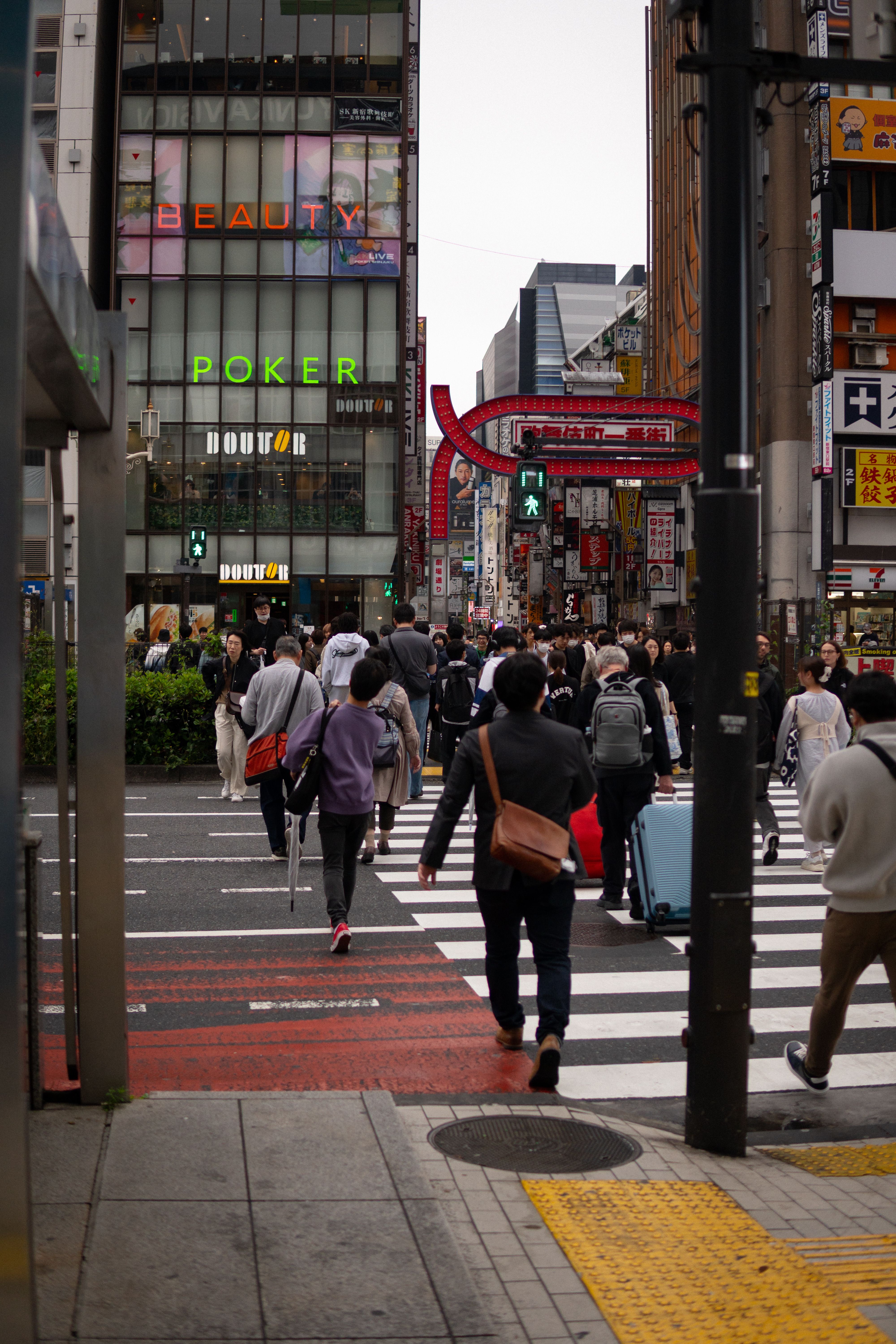Busy Tokyo Street Scene with Pedestrians and Neon Signs · Free Stock Photo