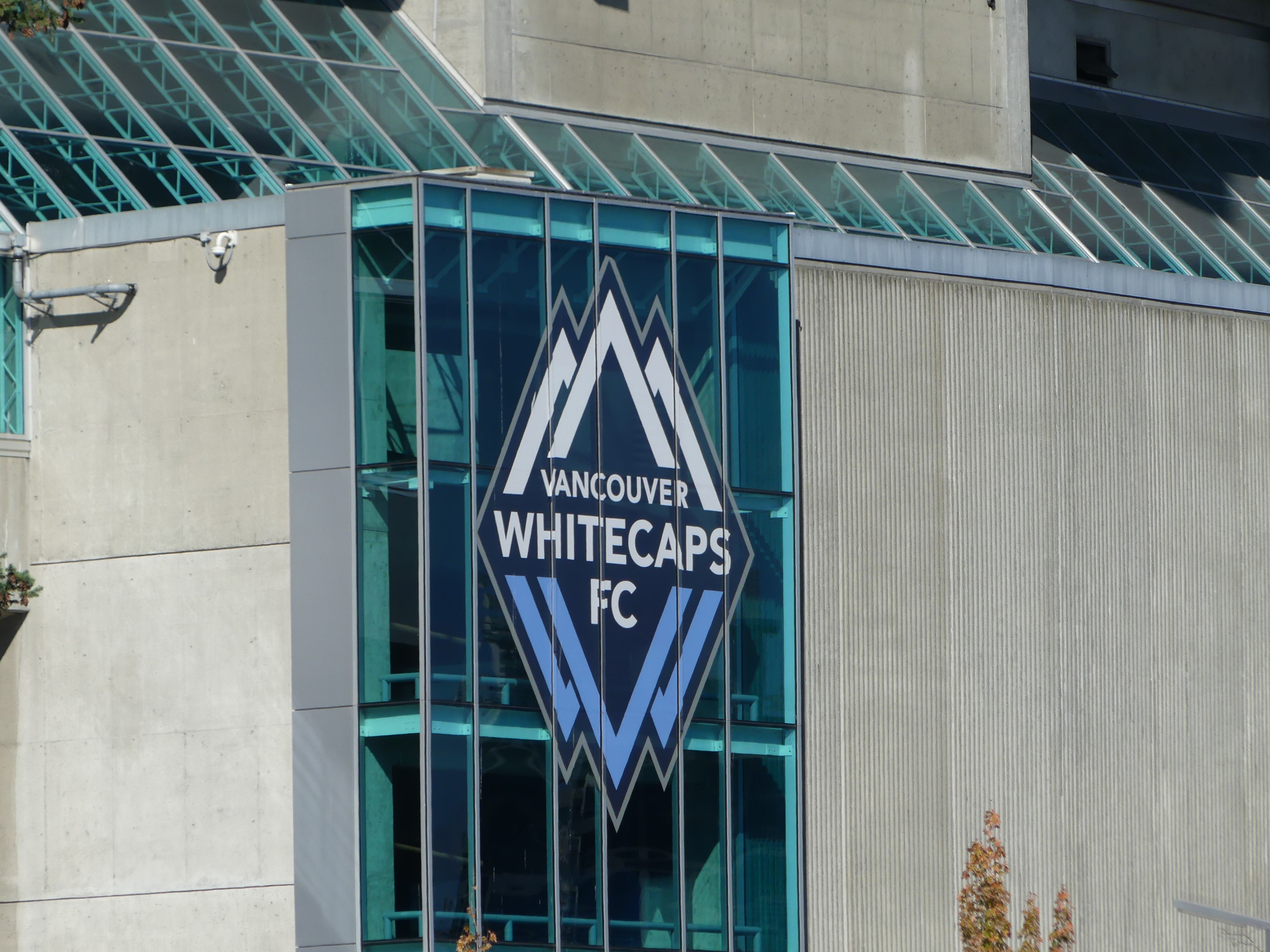 Vancouver Whitecaps FC Logo on Building Exterior · Free Stock Photo