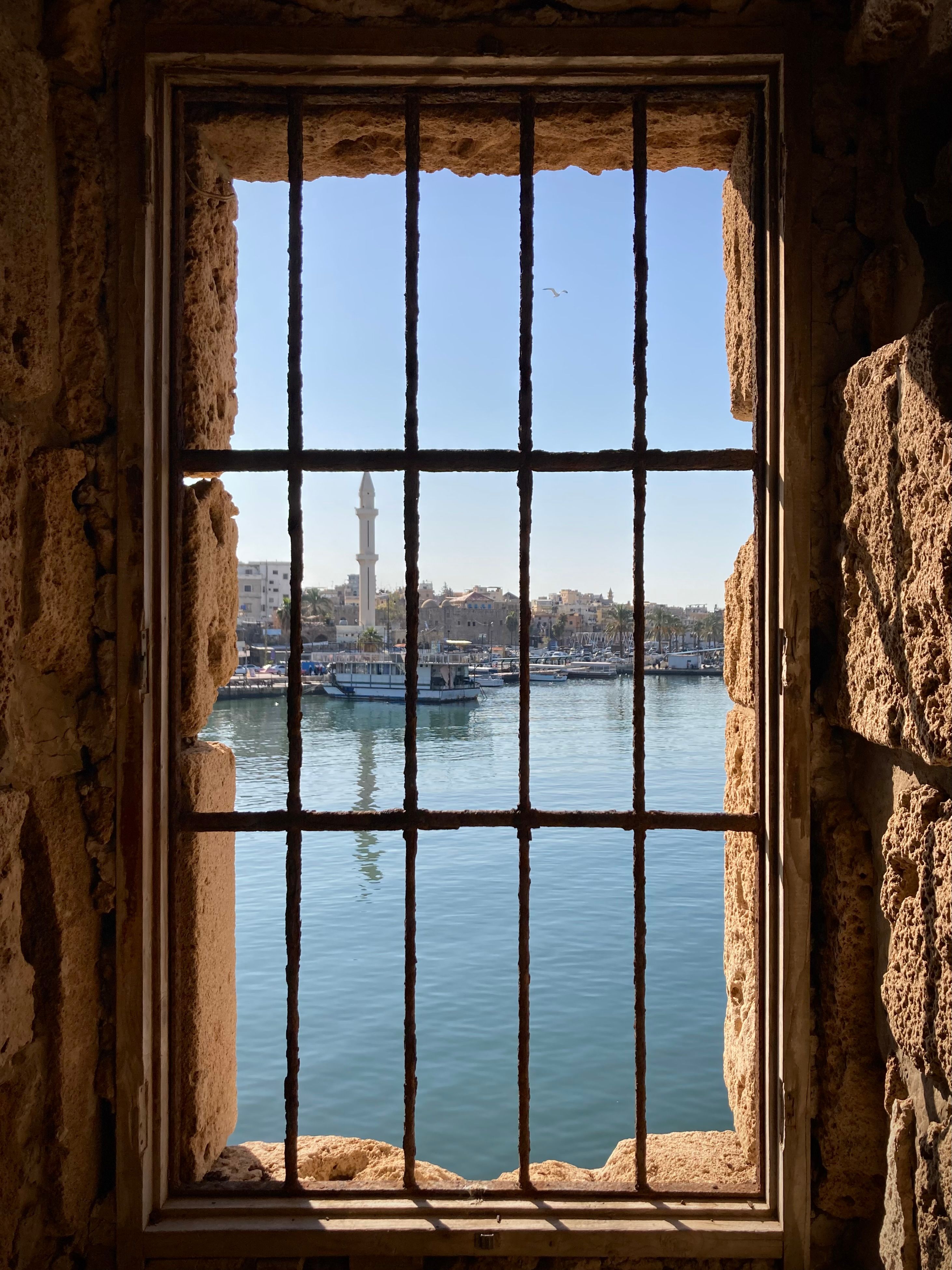 View of Sidon Harbor Through Ancient Ruins Window · Free Stock Photo