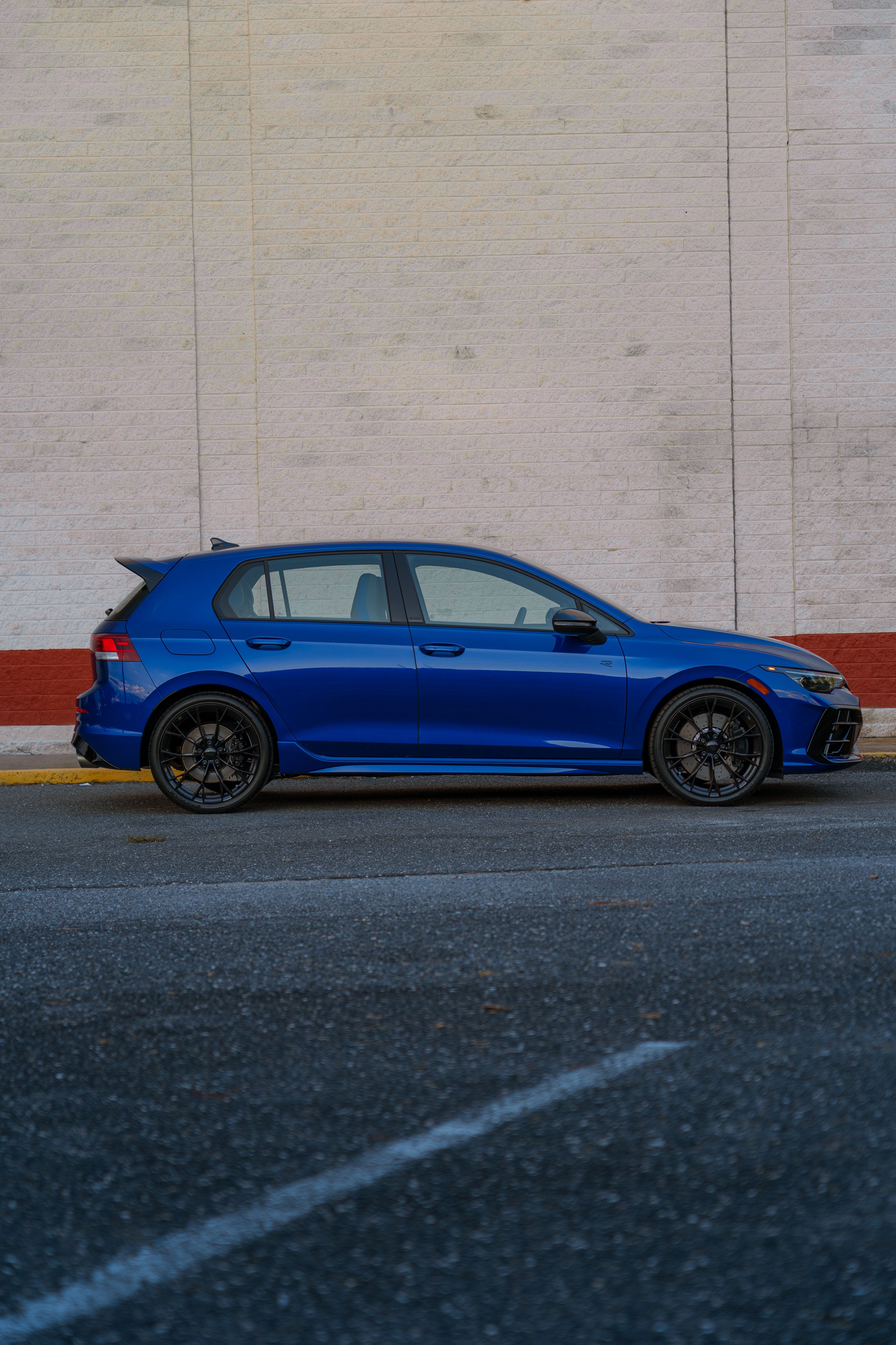 Blue Sporty Hatchback Car in Urban Setting · Free Stock Photo