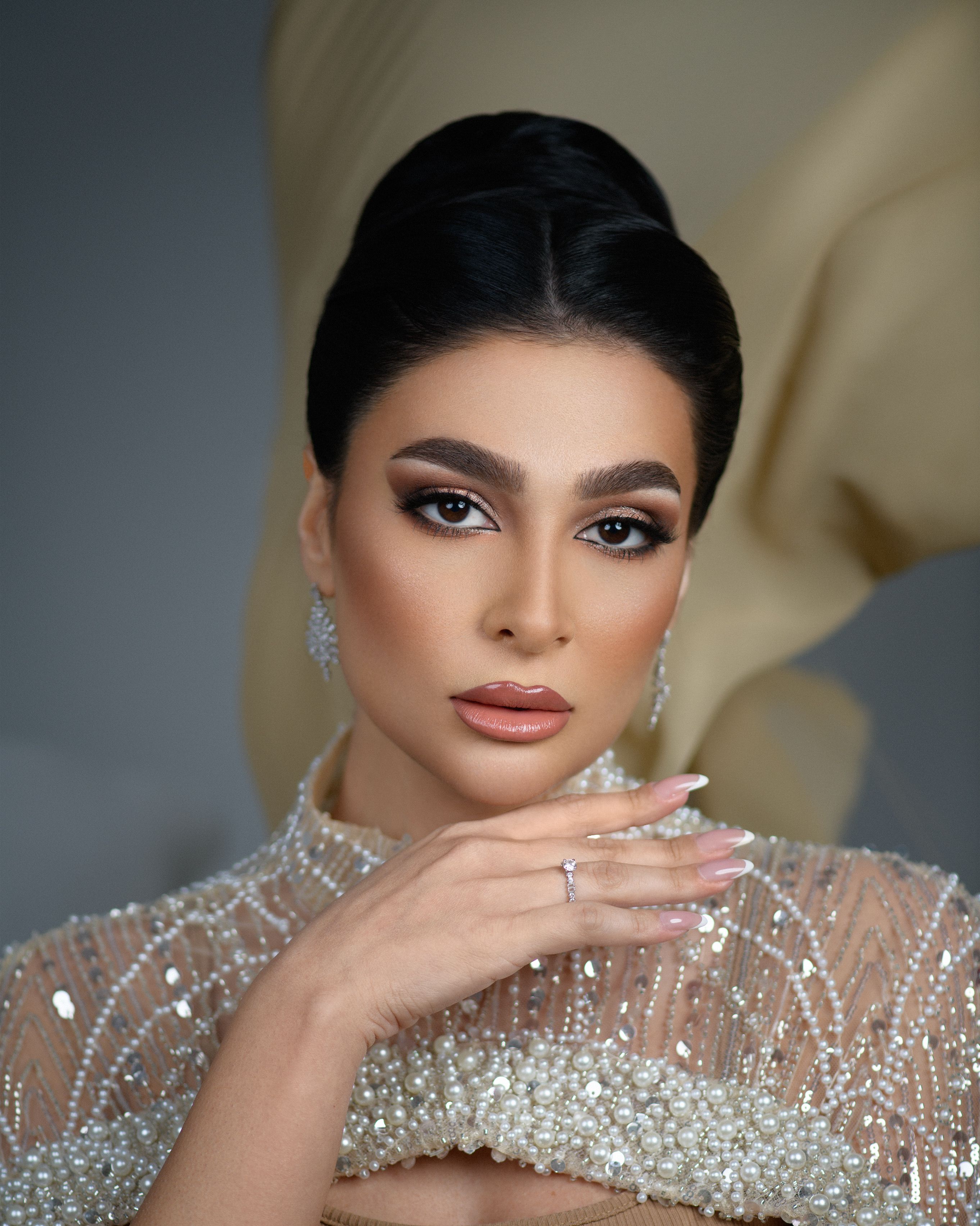 Elegant Middle Eastern Woman in Glamorous Attire · Free Stock Photo