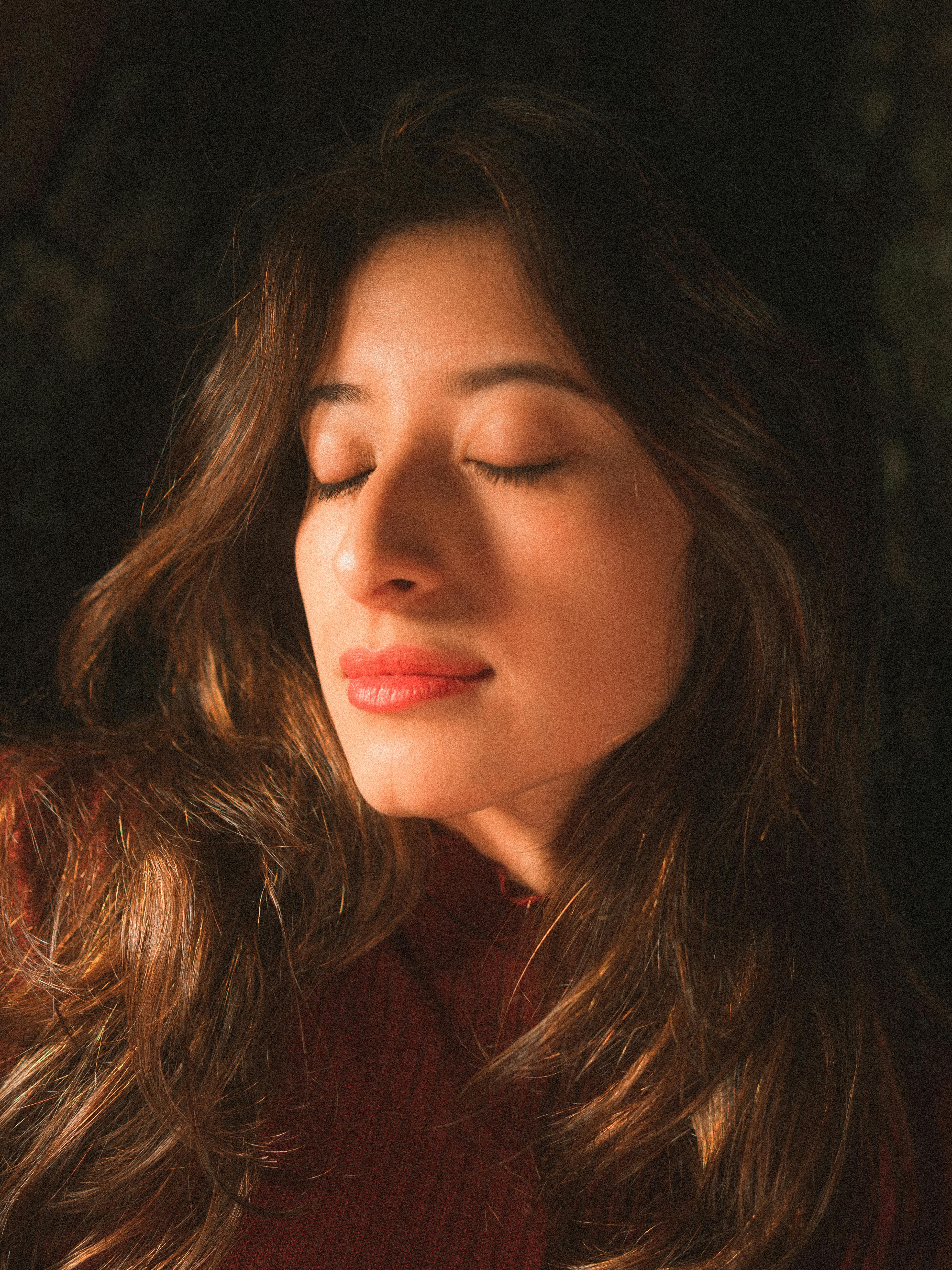 Peaceful Portrait of a Woman in Warm Light · Free Stock Photo