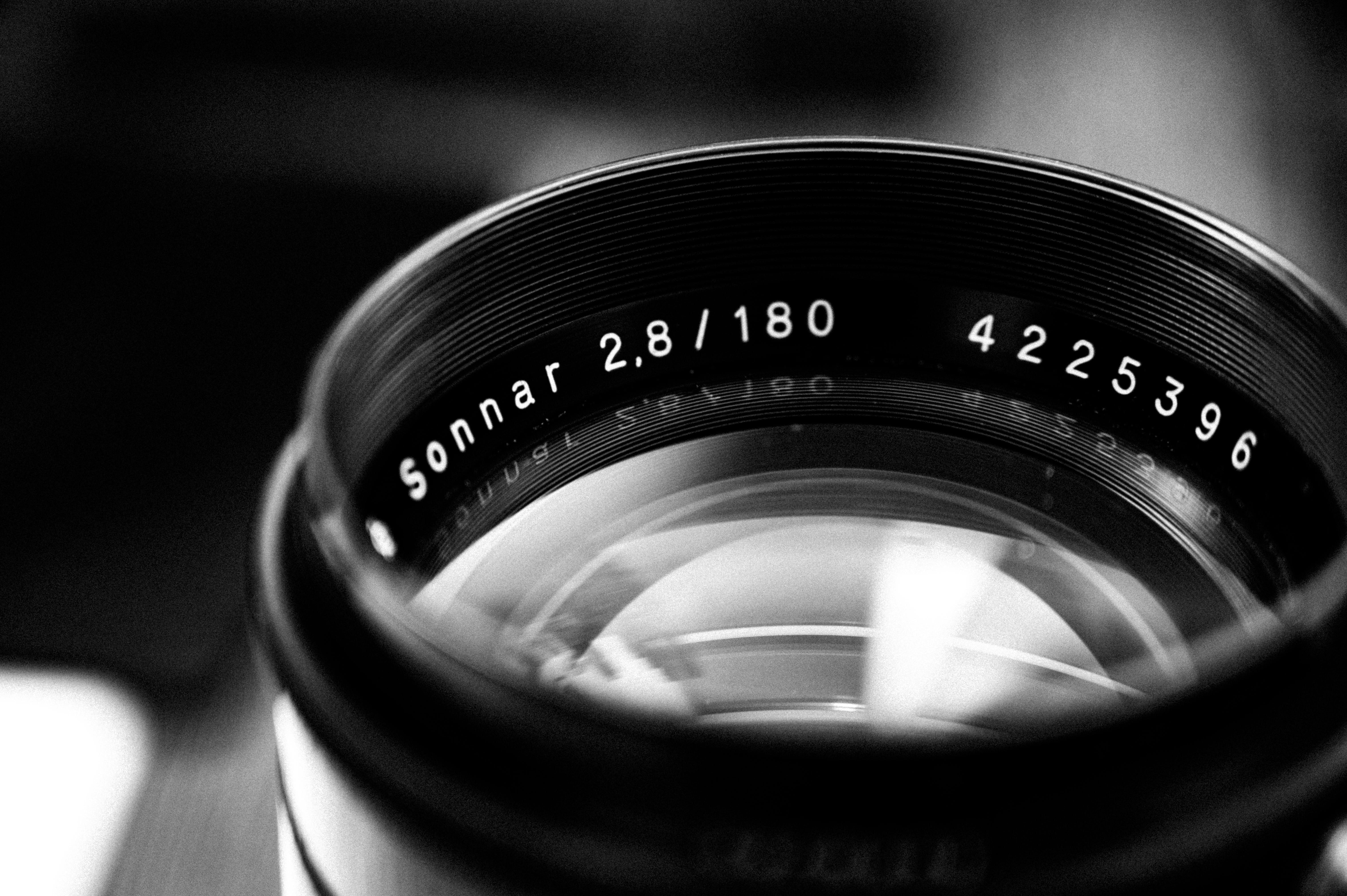 Grayscale Photo of Camera Lens · Free Stock Photo