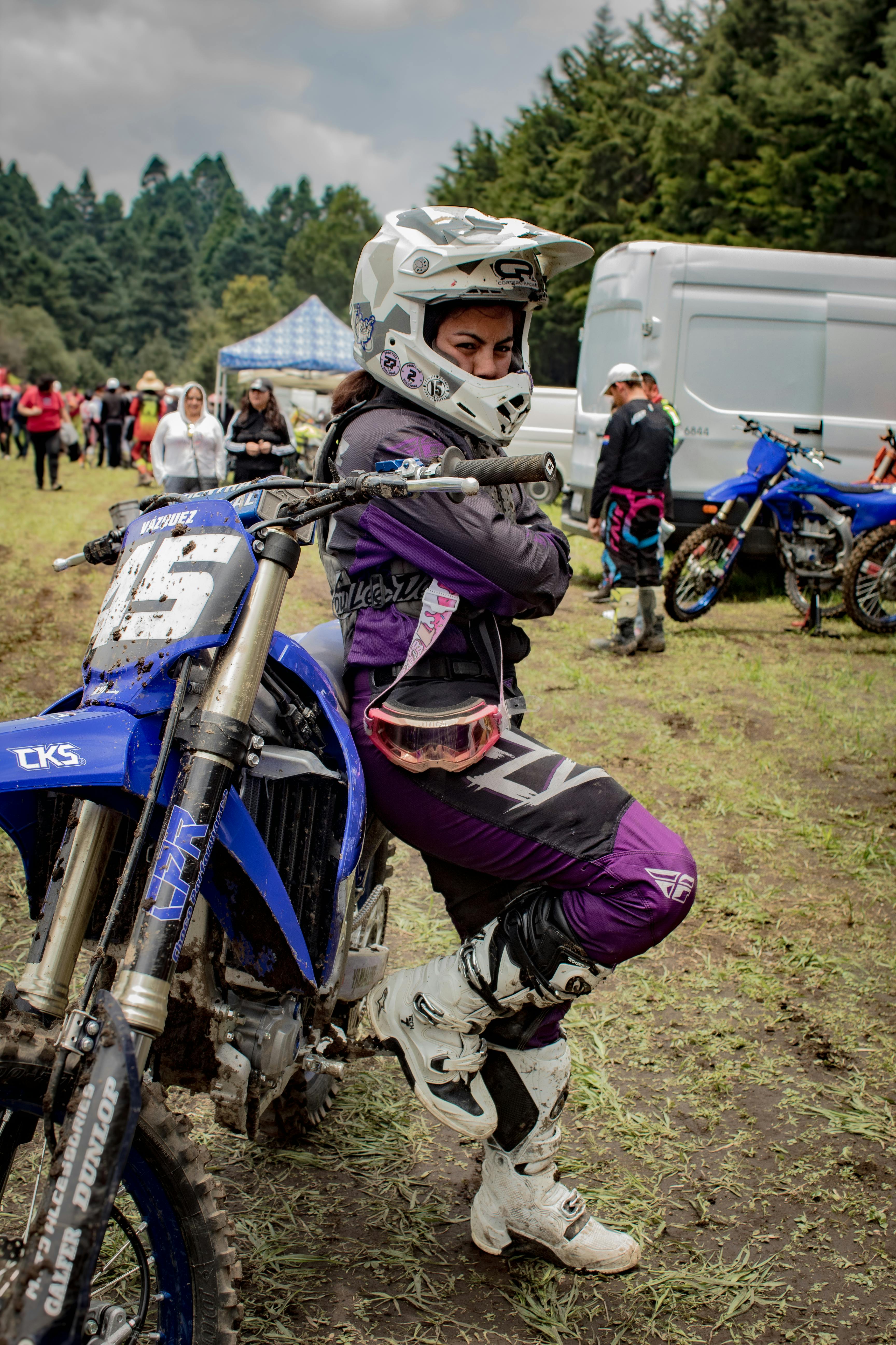 Motocross Rider Poses Next to Bike in Mexican Forest · Free Stock Photo