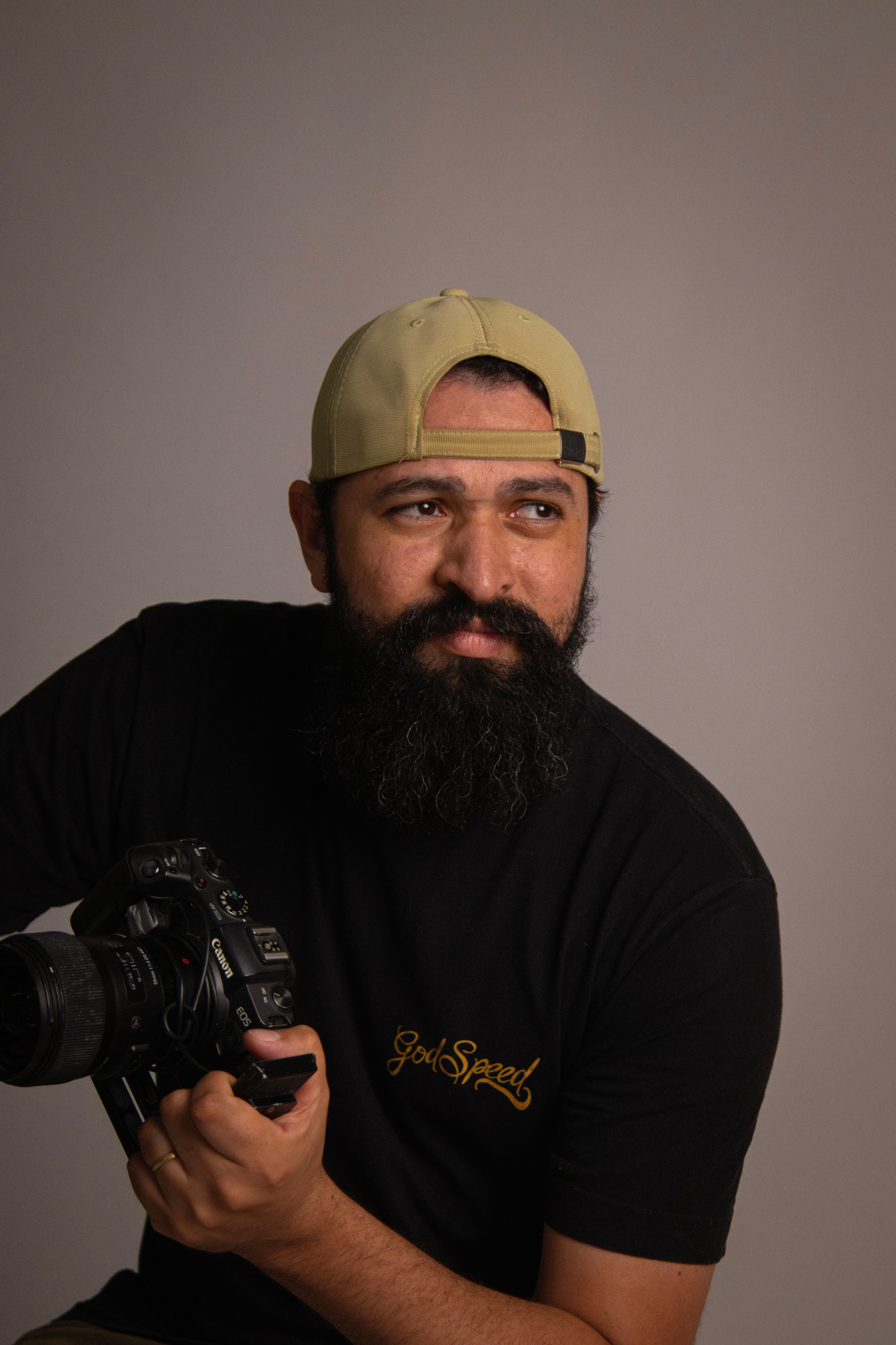 Portrait of Bearded Photographer with Camera · Free Stock Photo
