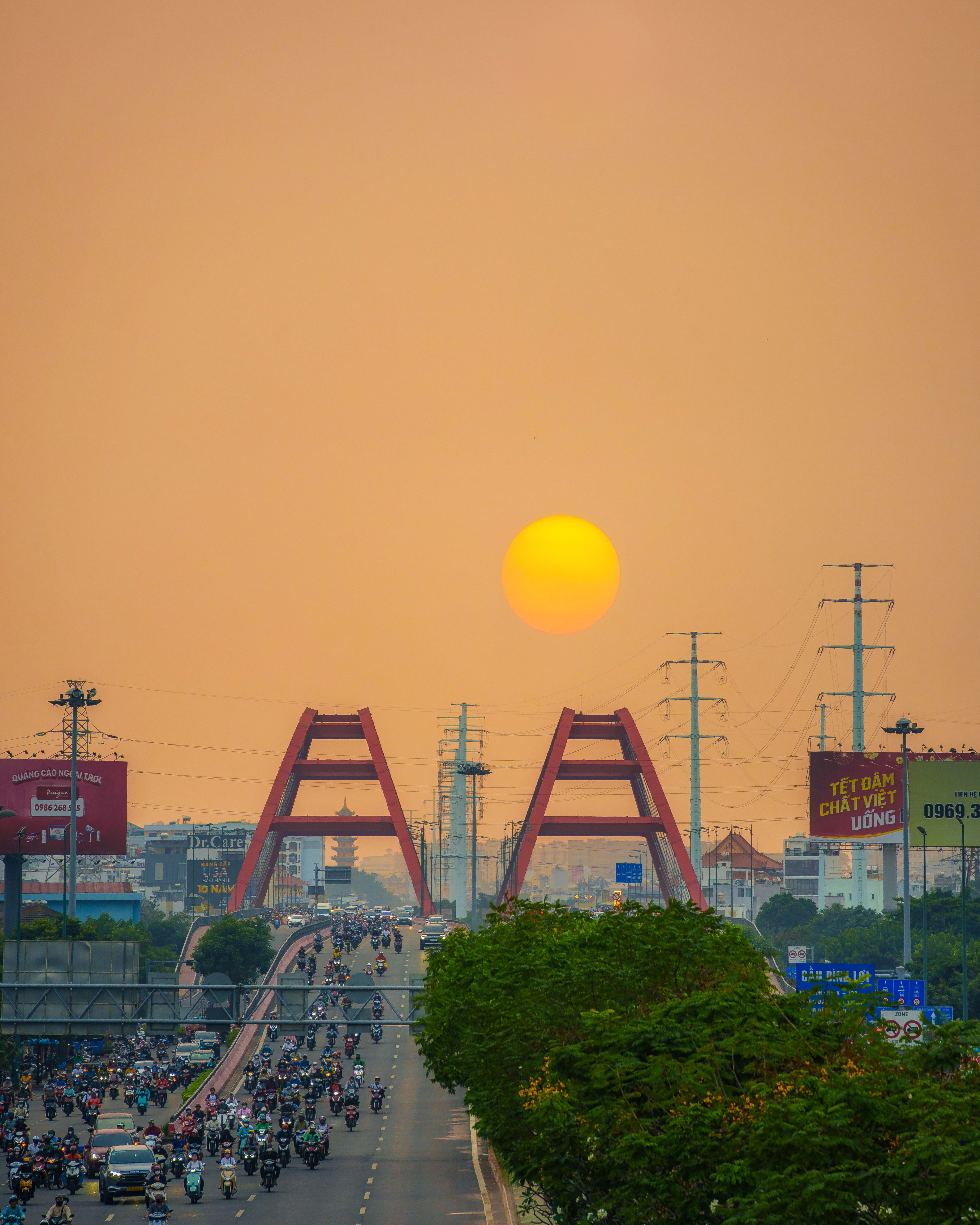 Bustling City Bridge at Sunset in Vietnam · Free Stock Photo