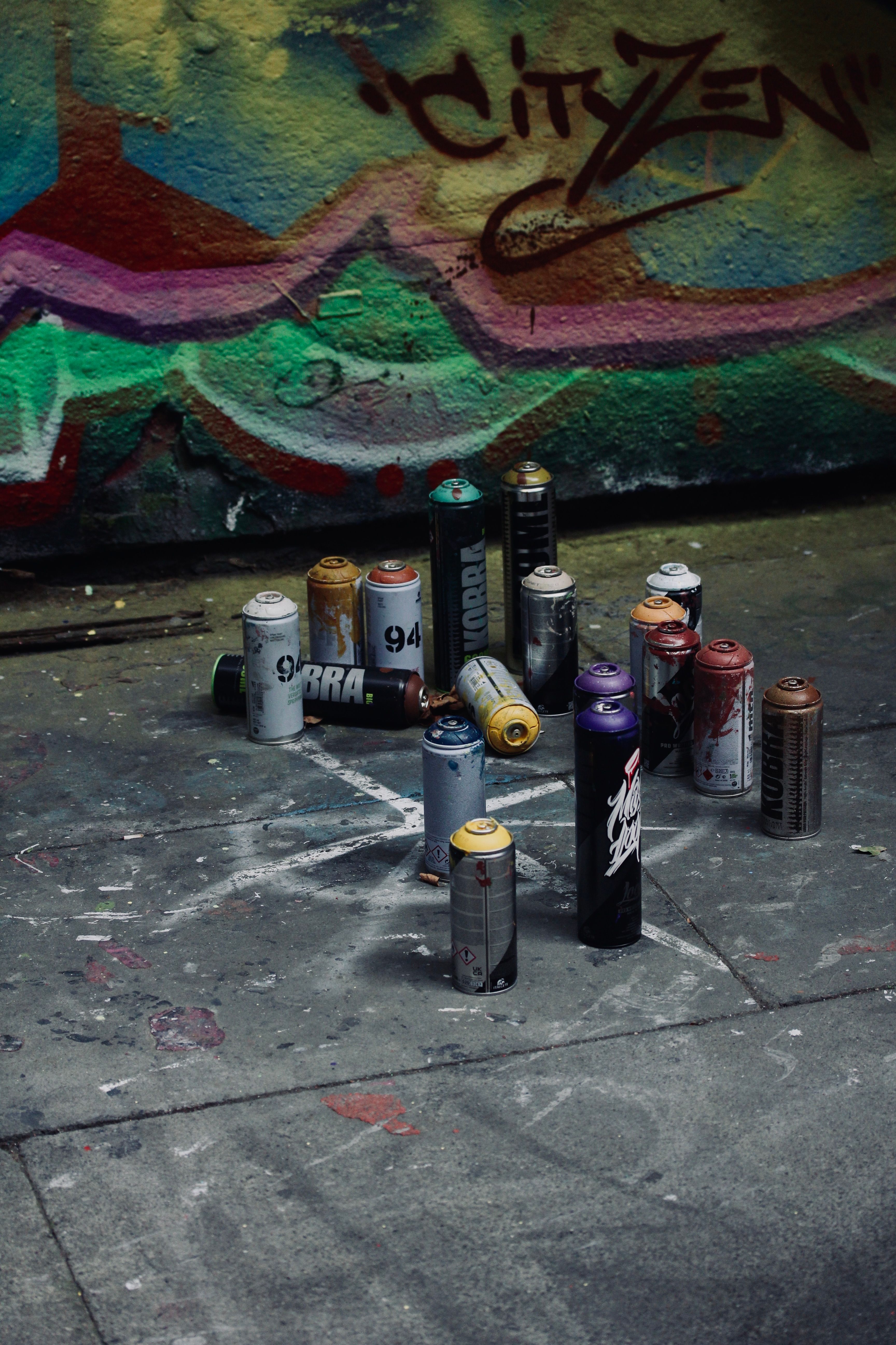 Street Art Scene with Spray Paint Cans · Free Stock Photo