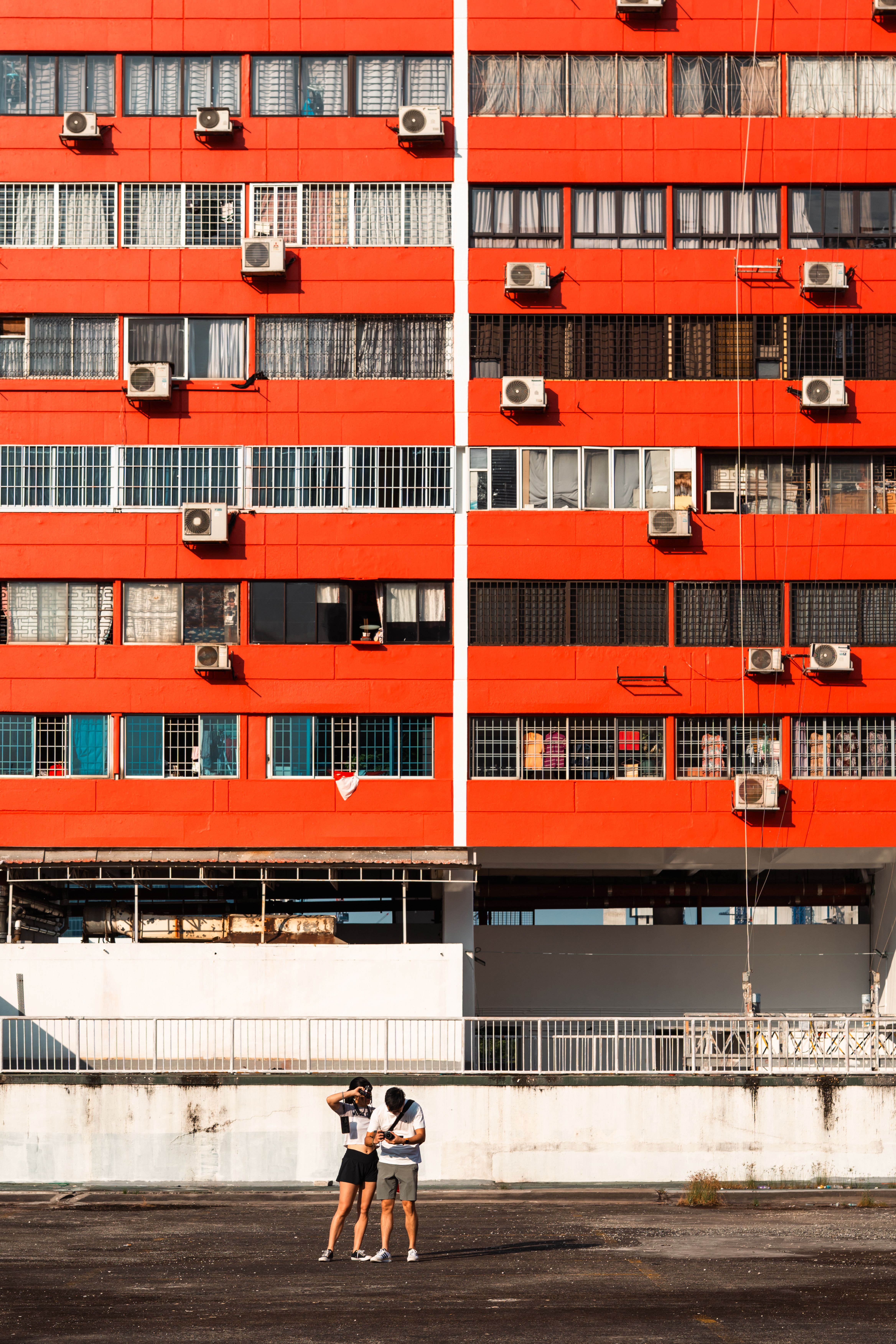 Vibrant Red Facade of Singapore Building · Free Stock Photo