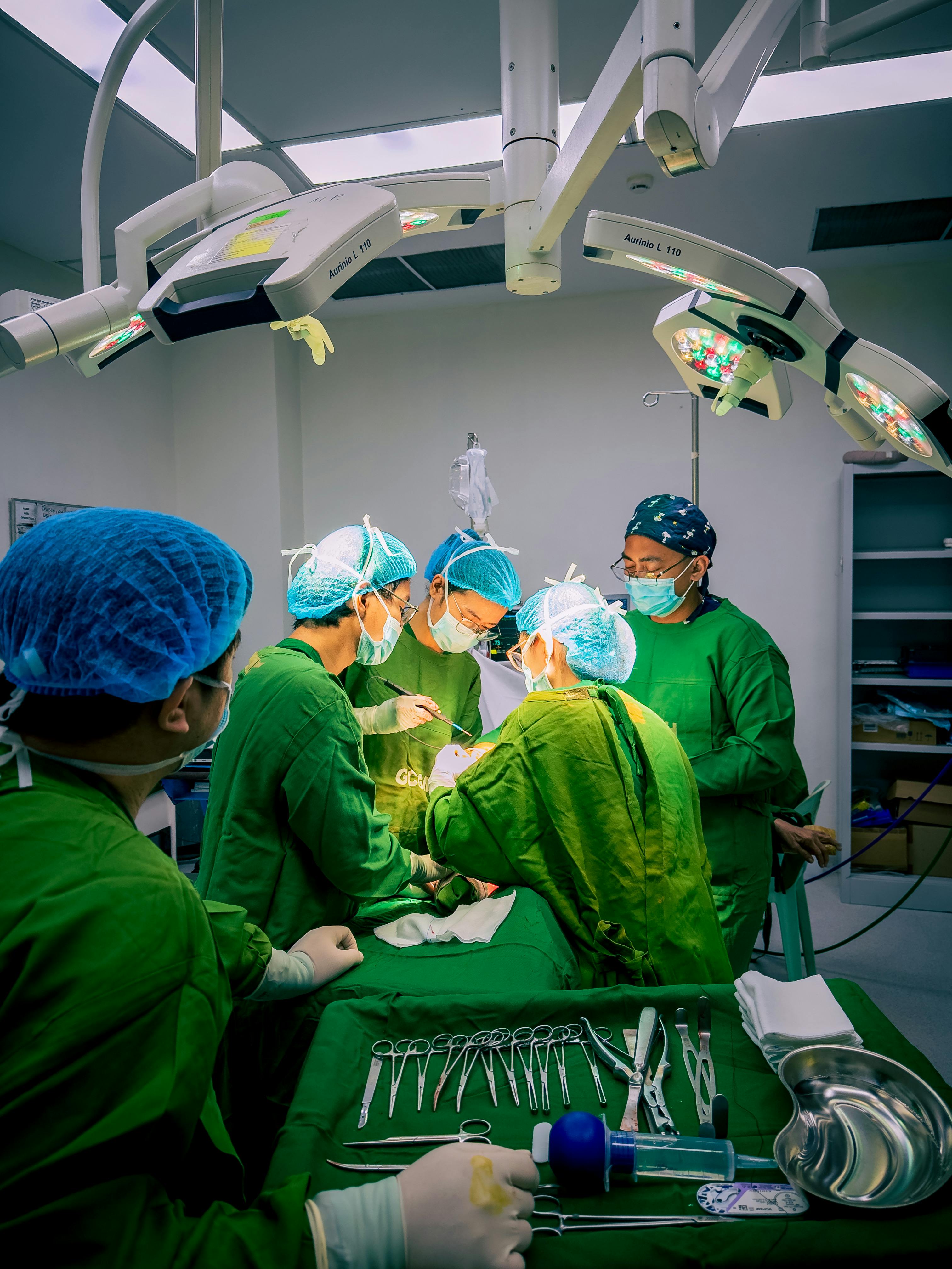 Group of Doctors Doing Operation Inside Room · Free Stock Photo