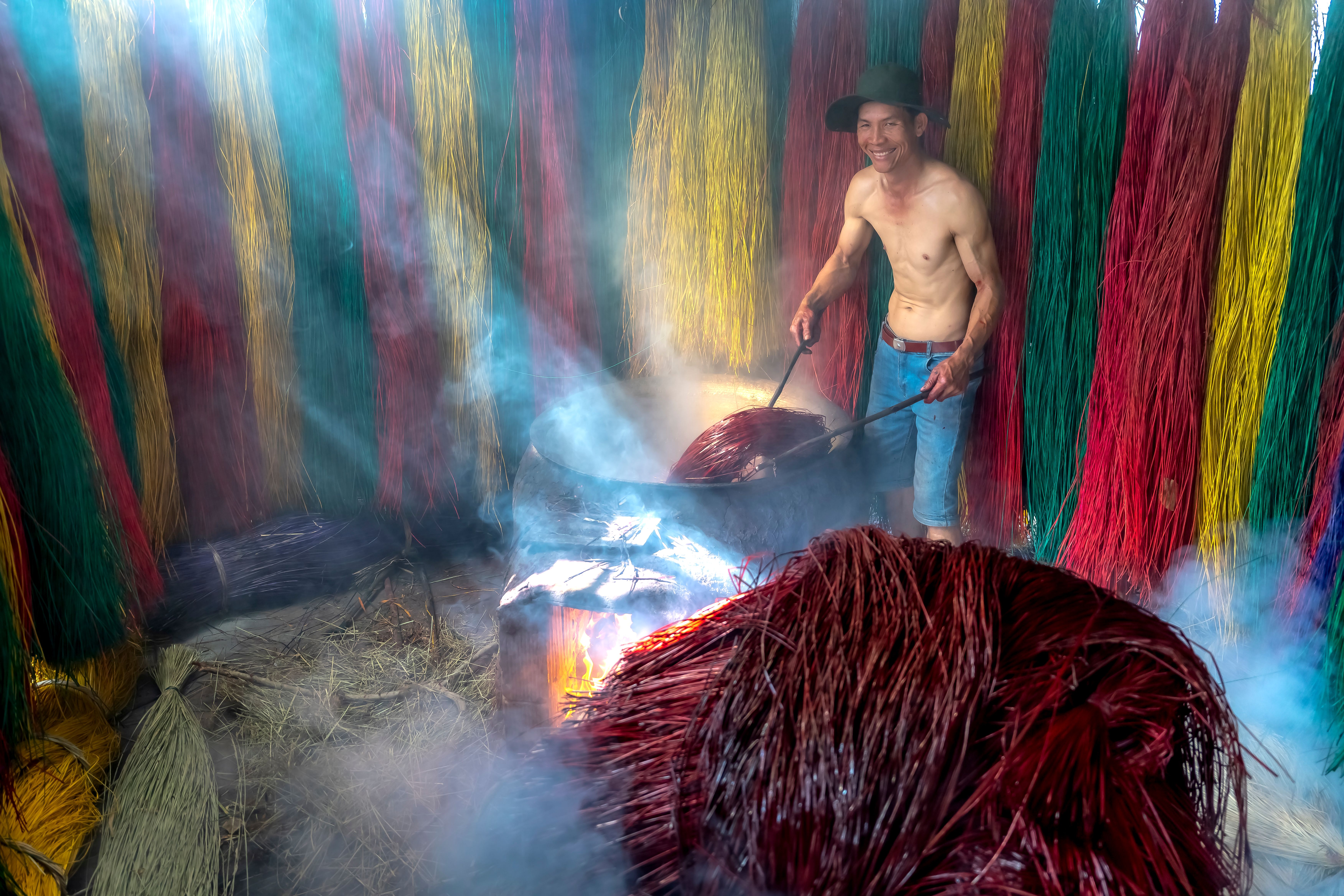 Colorful Traditional Dyeing Process in Workshop · Free Stock Photo