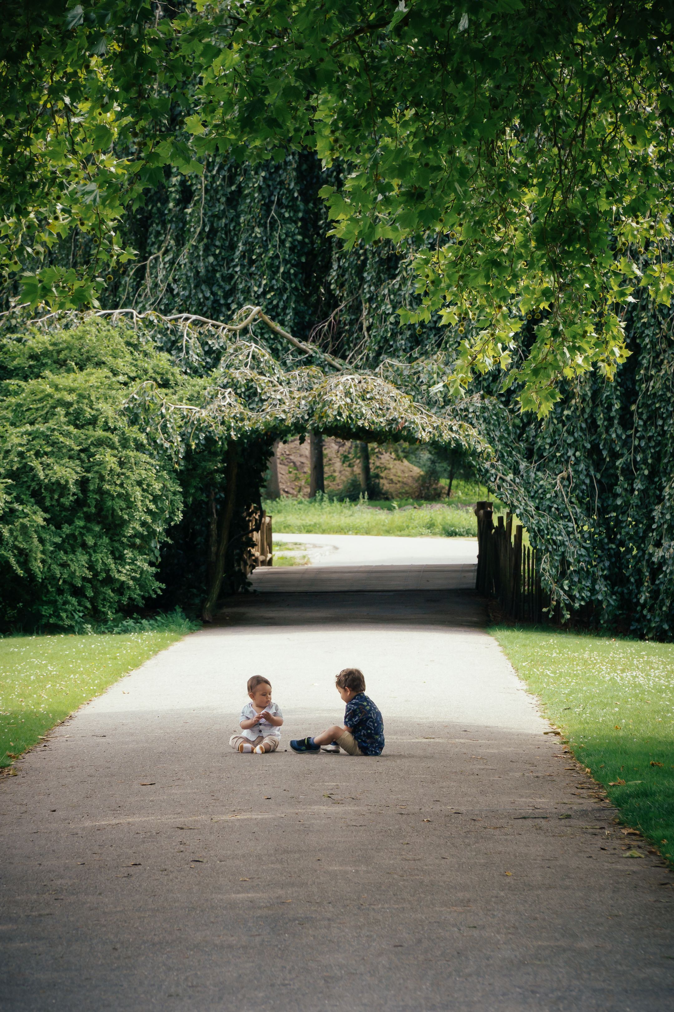 Playful Kids on Pathway in Utrecht Park · Free Stock Photo
