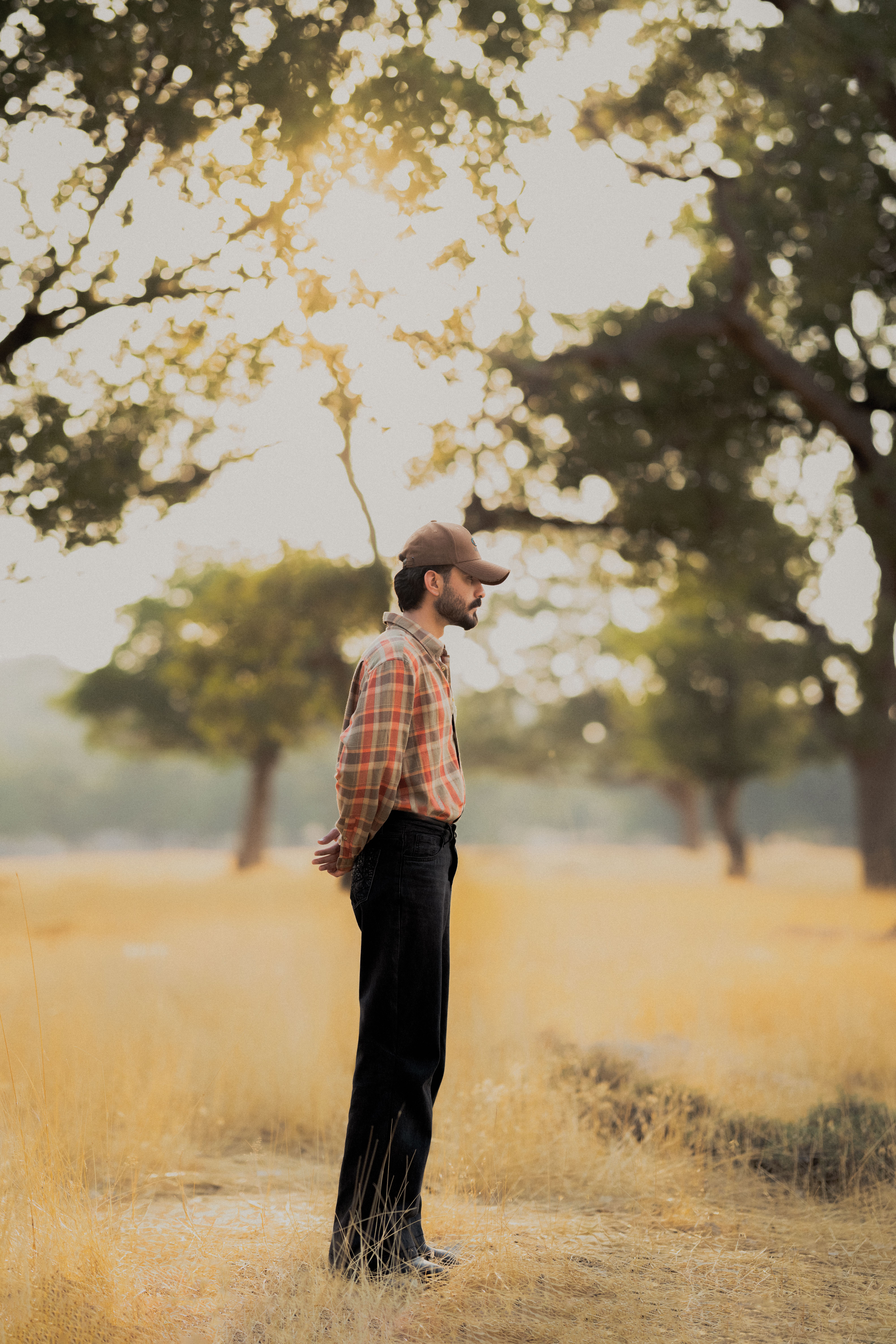 Man in Nature with Sunlit Background · Free Stock Photo