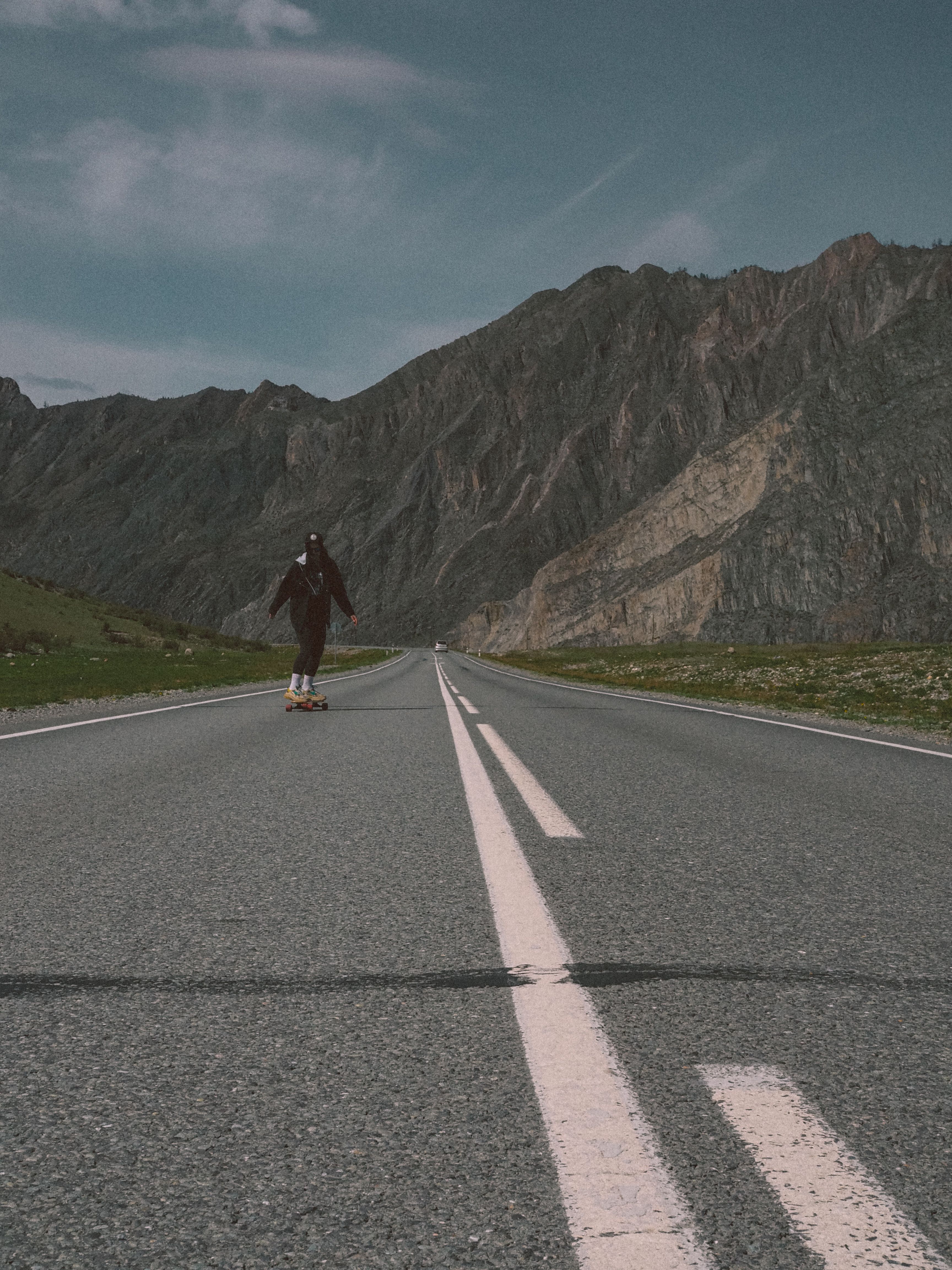 Man Running down a Highway · Free Stock Photo