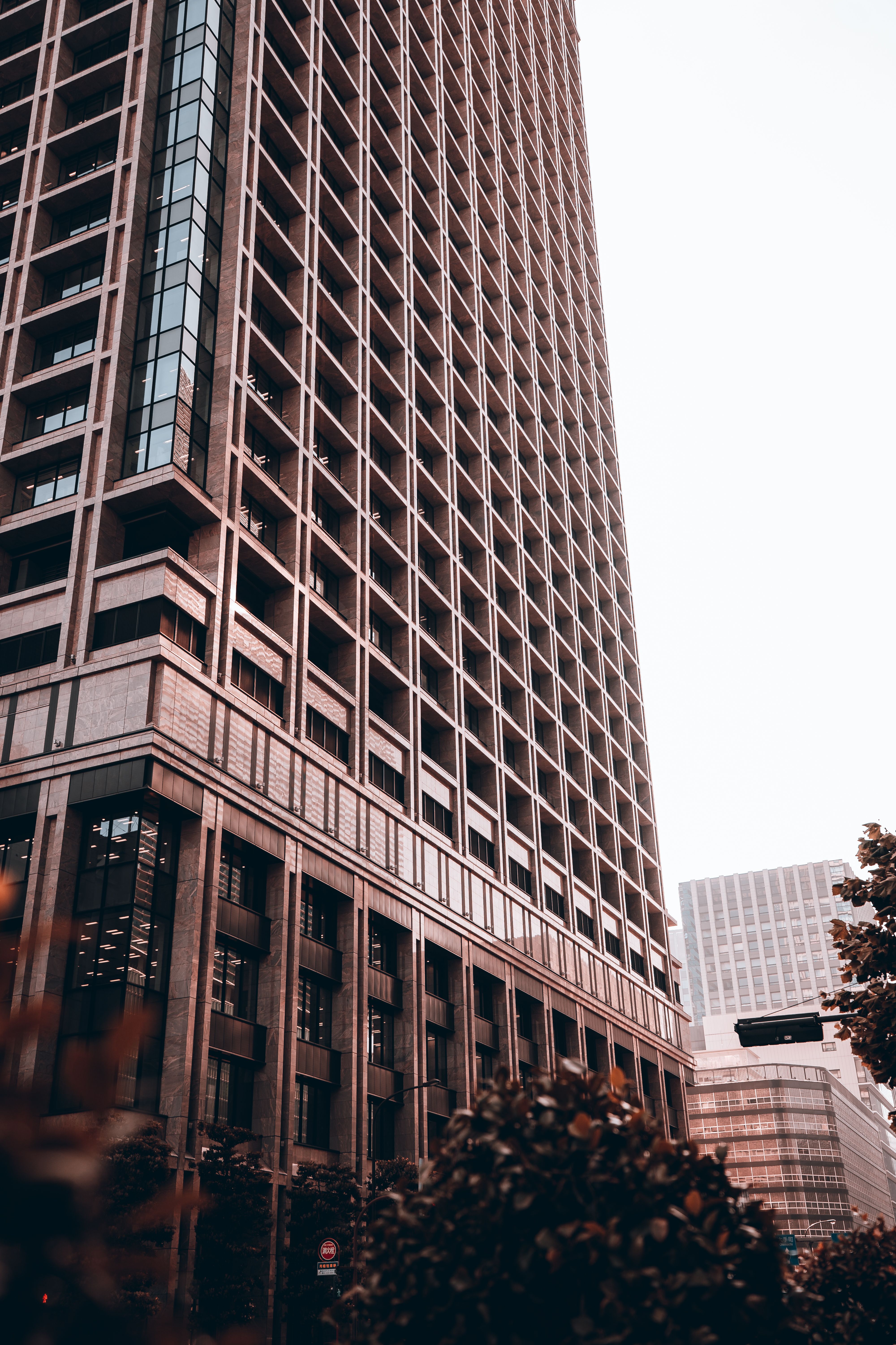 Modern Skyscraper in Tokyo's Urban Landscape · Free Stock Photo