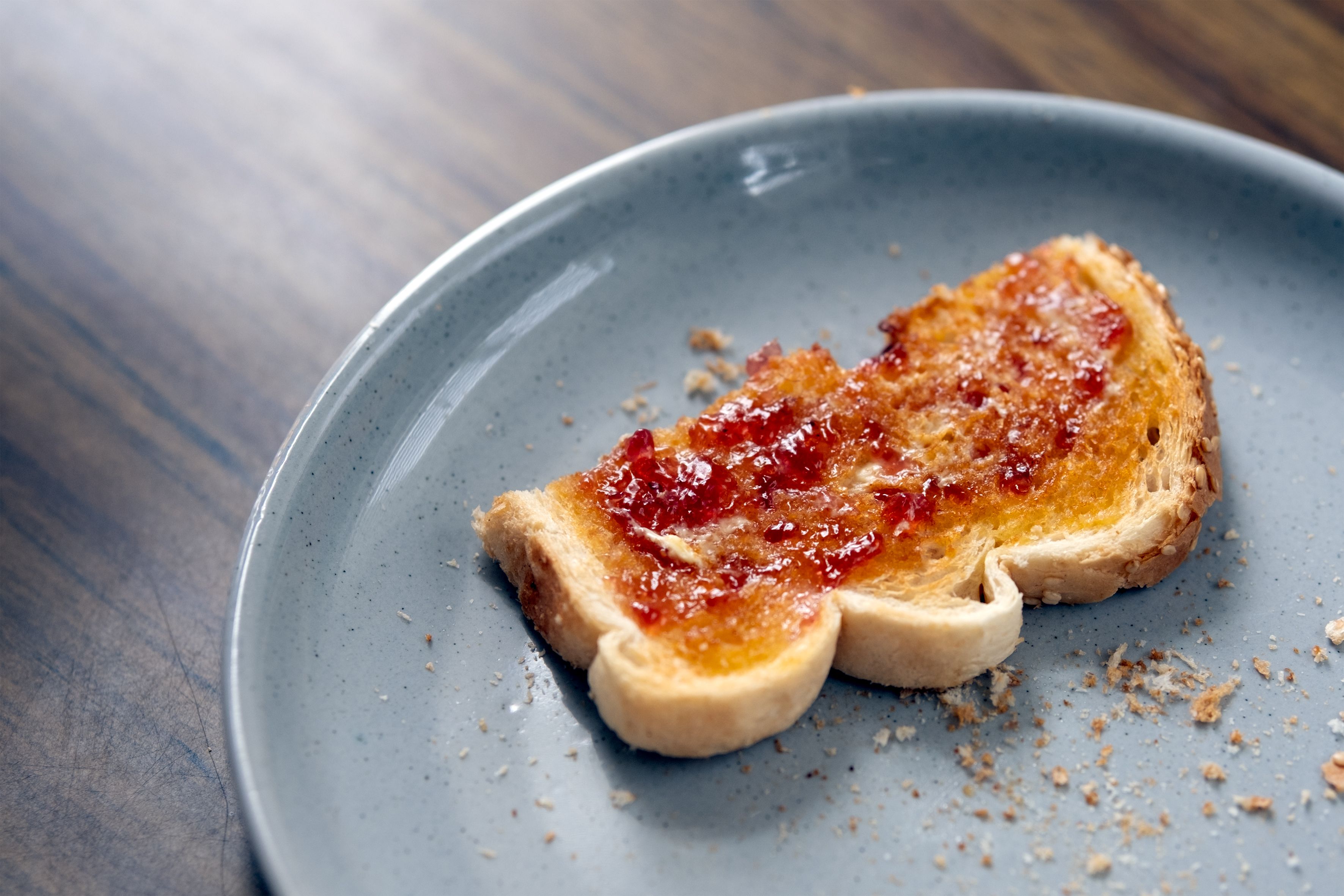 Slice of Toast with Jam on Blue Plate · Free Stock Photo