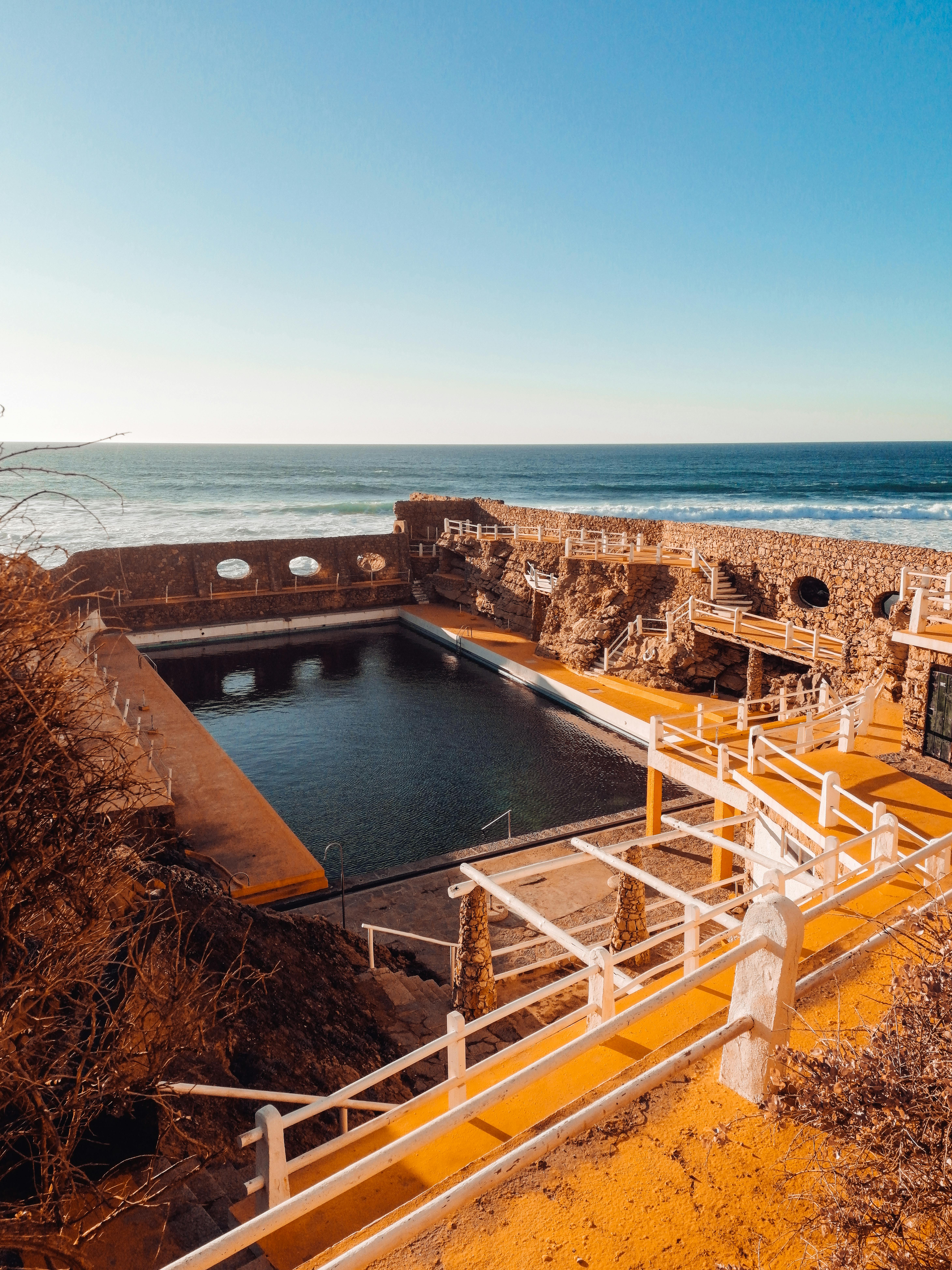 Photo Of Structure Near Sea · Free Stock Photo