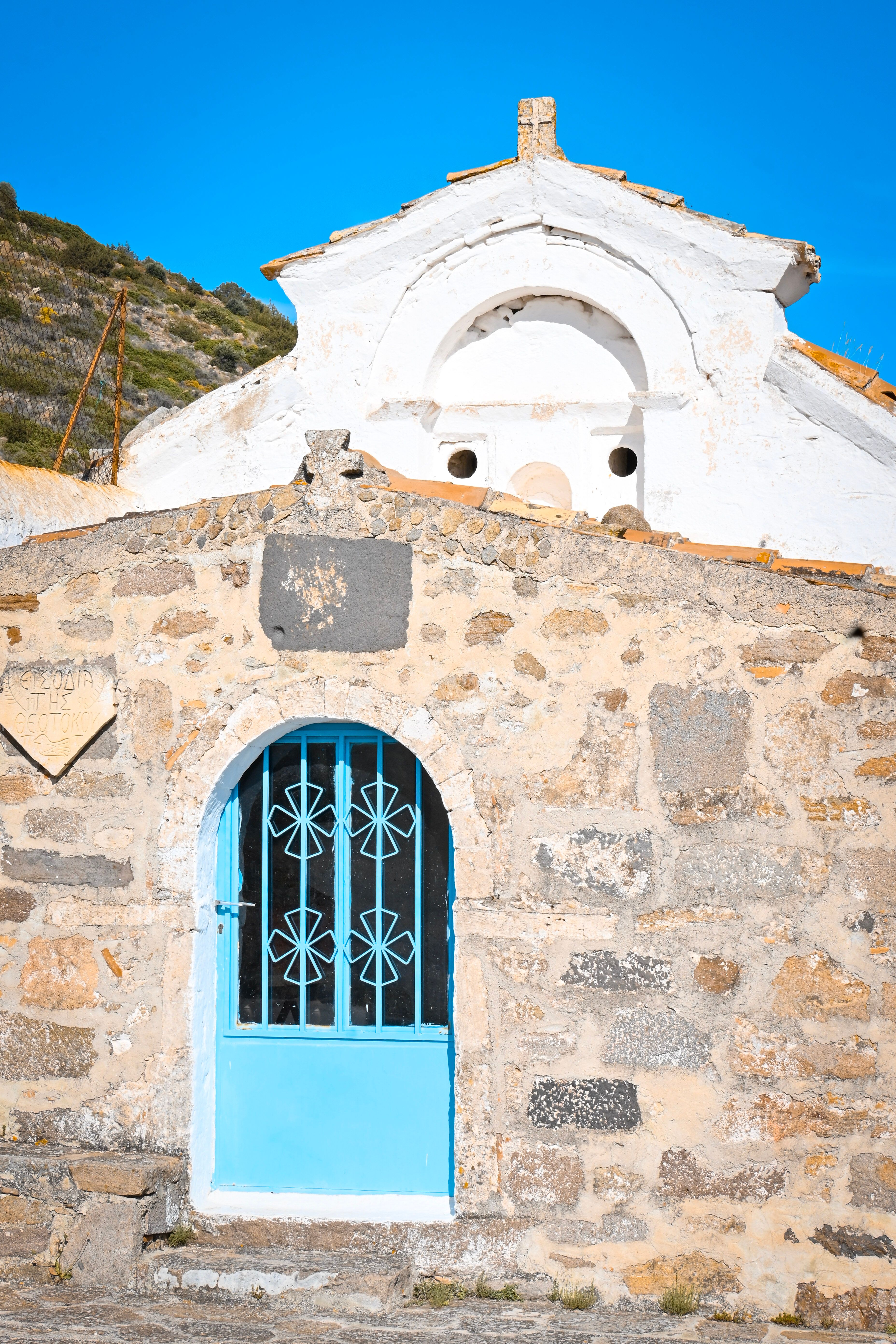 Rustic Greek Stone Building with Blue Door · Free Stock Photo