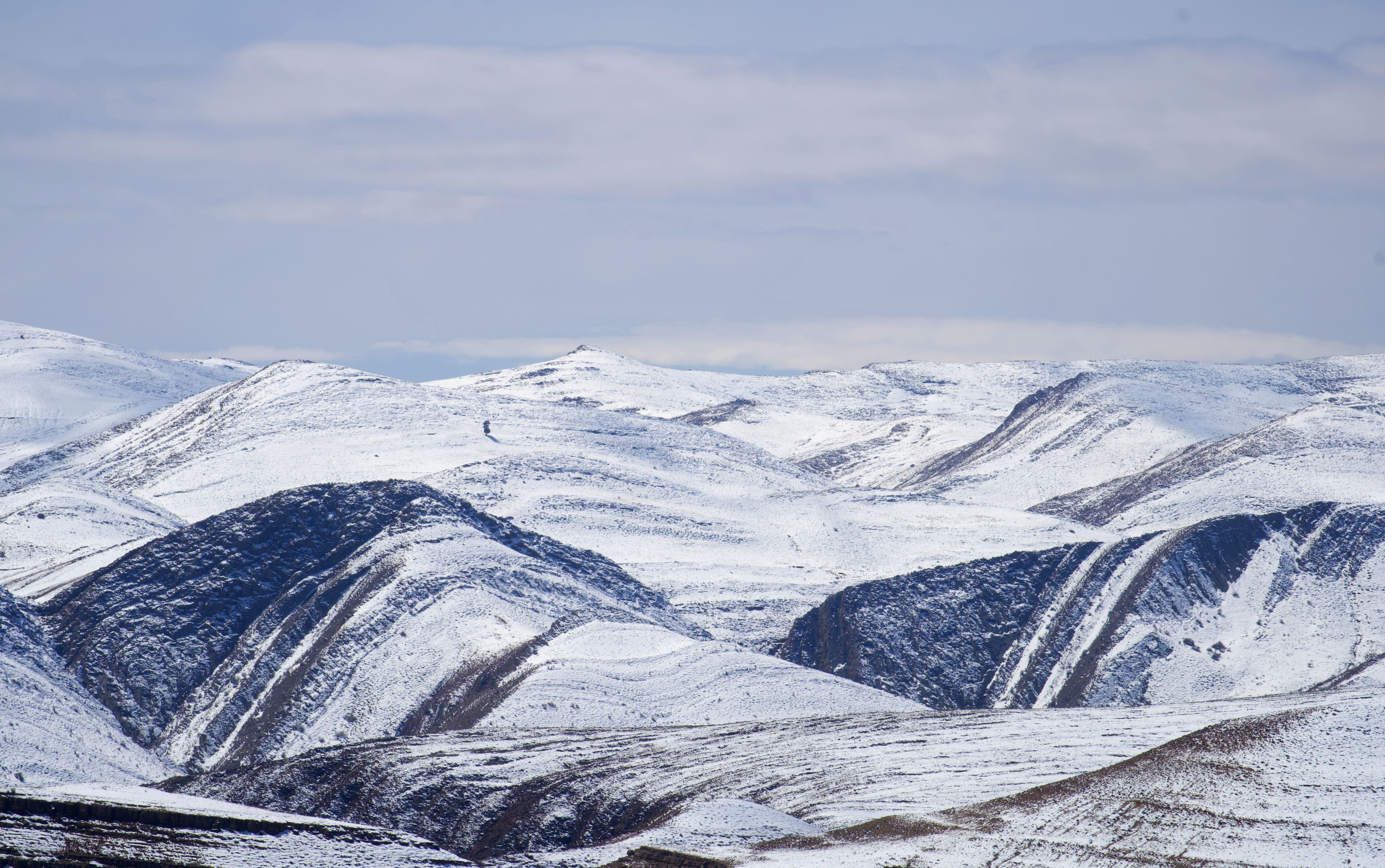 Snow-Capped Mountain Range in Winter Landscape · Free Stock Photo