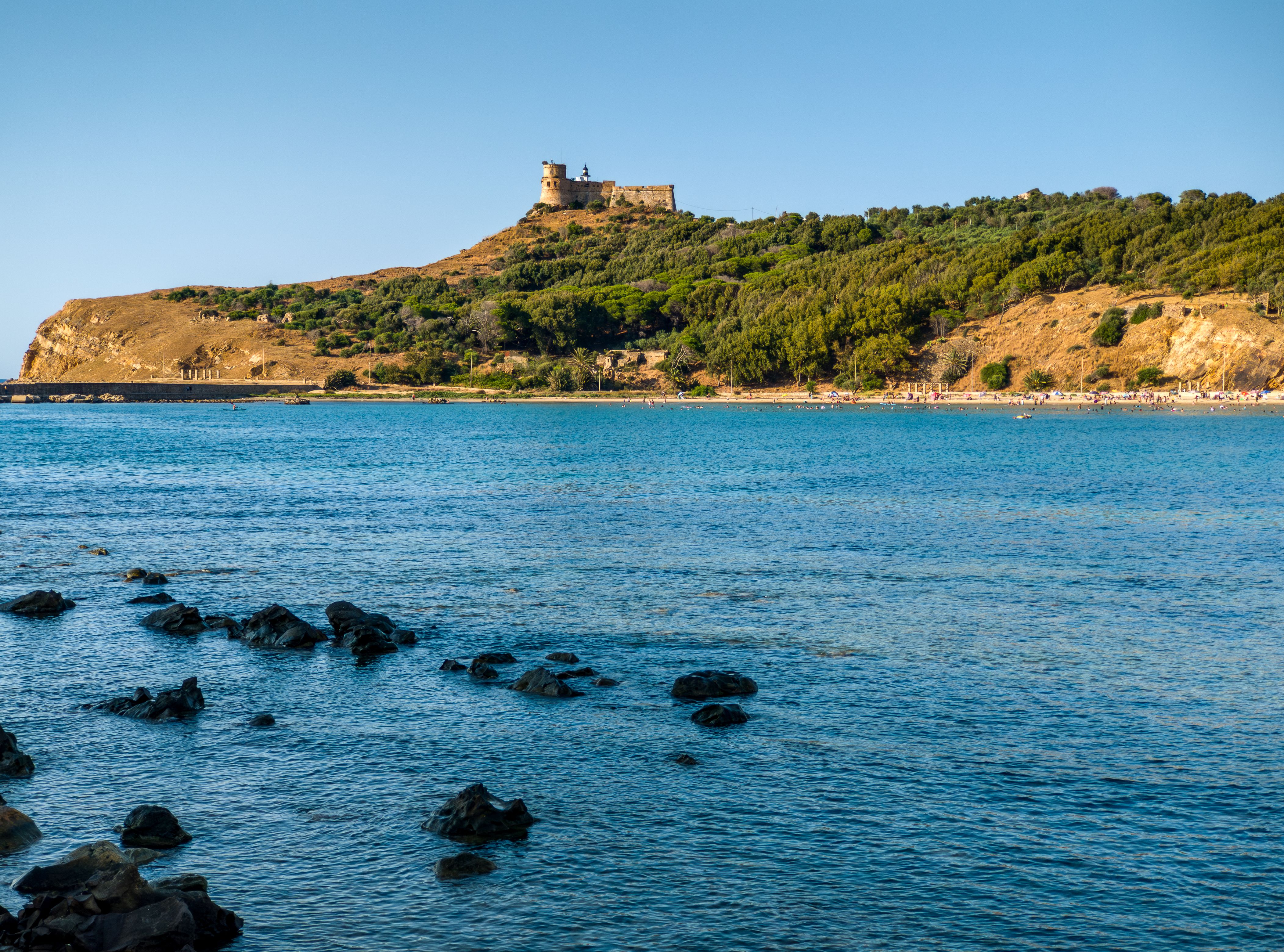 Dramatic Cliffside Fortress Overlooking Ocean Waves · Free Stock Photo