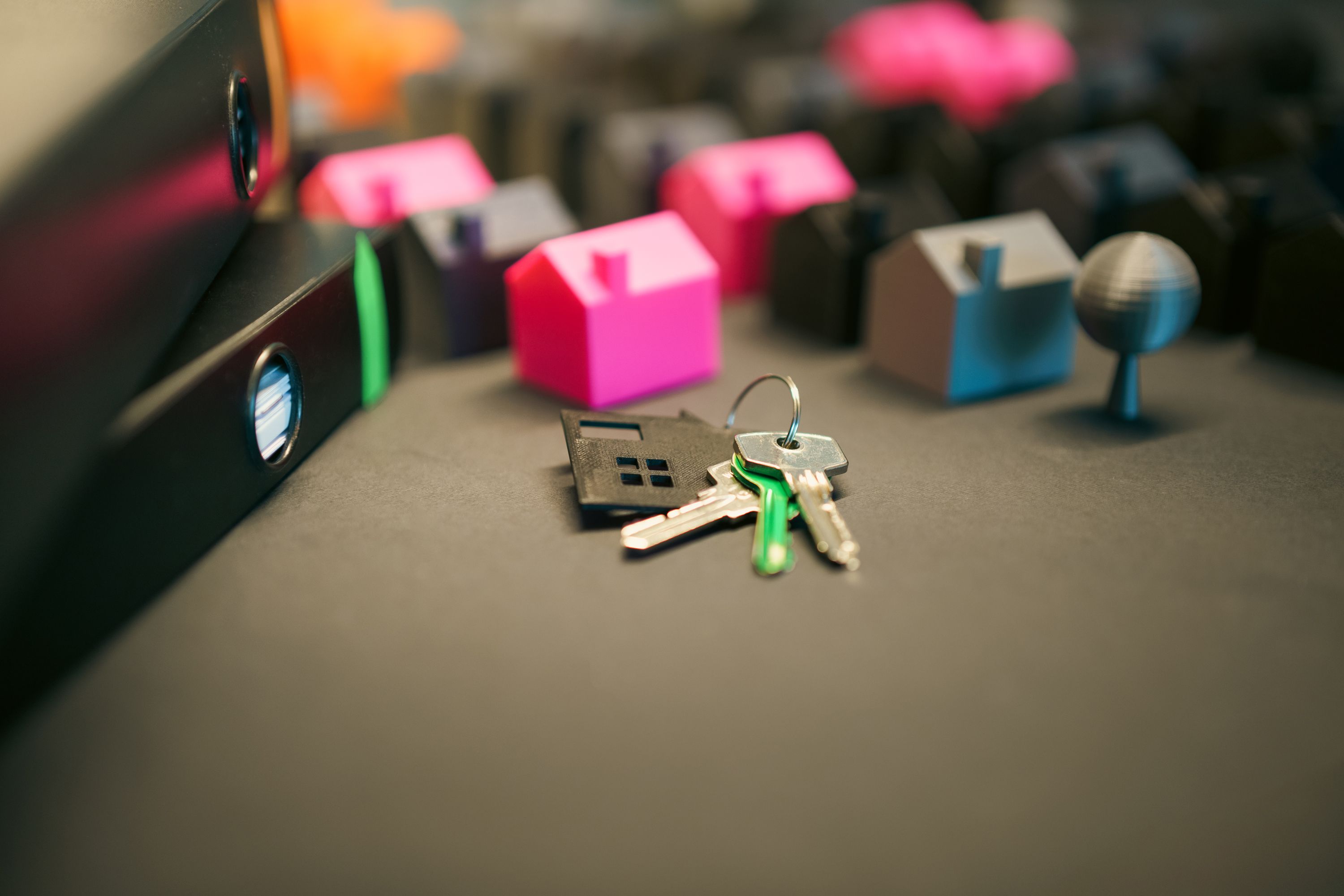 Miniature Model Houses with Keys on Desk · Free Stock Photo