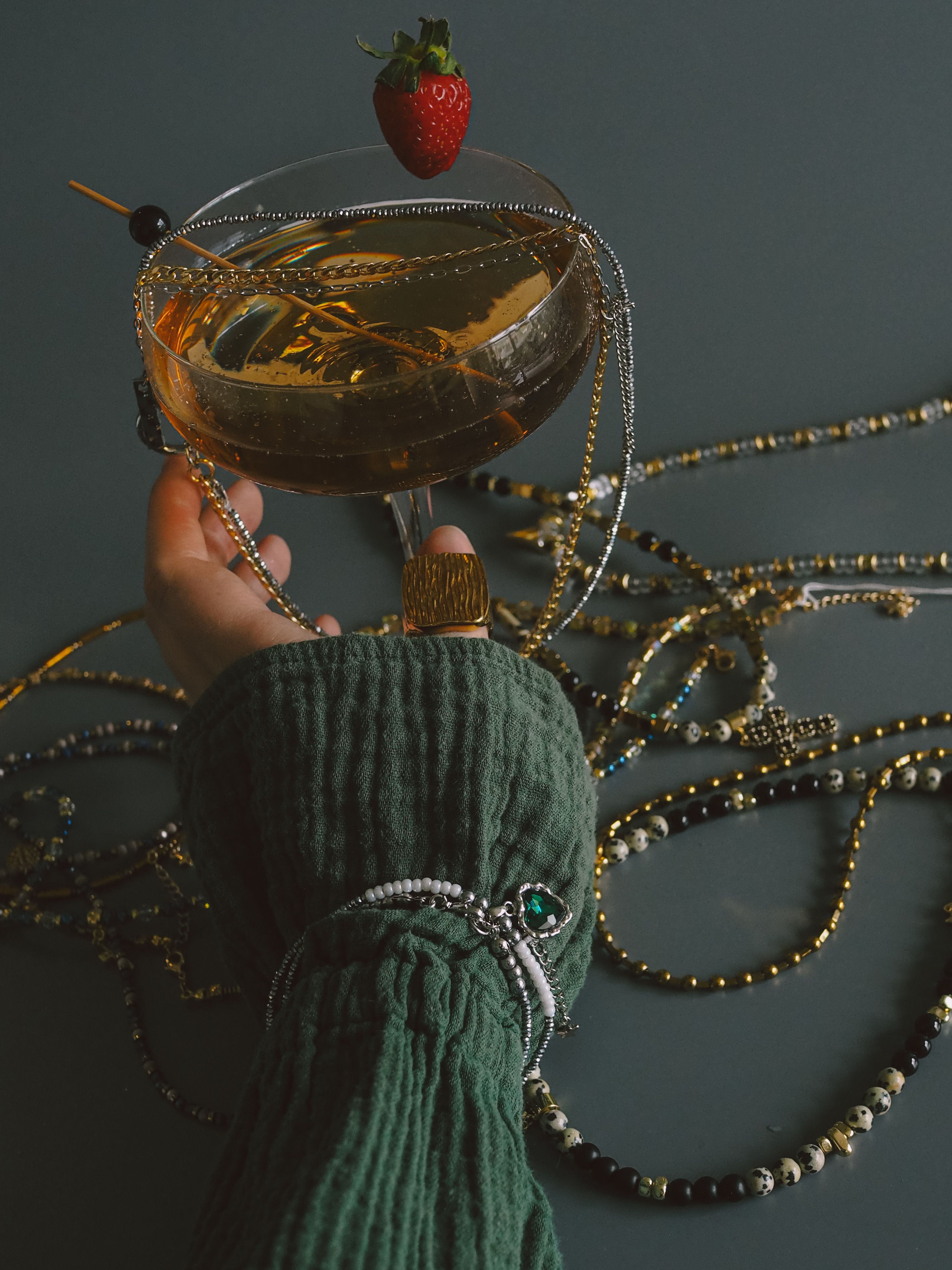 Elegant Champagne Glass with Beaded Jewelry · Free Stock Photo