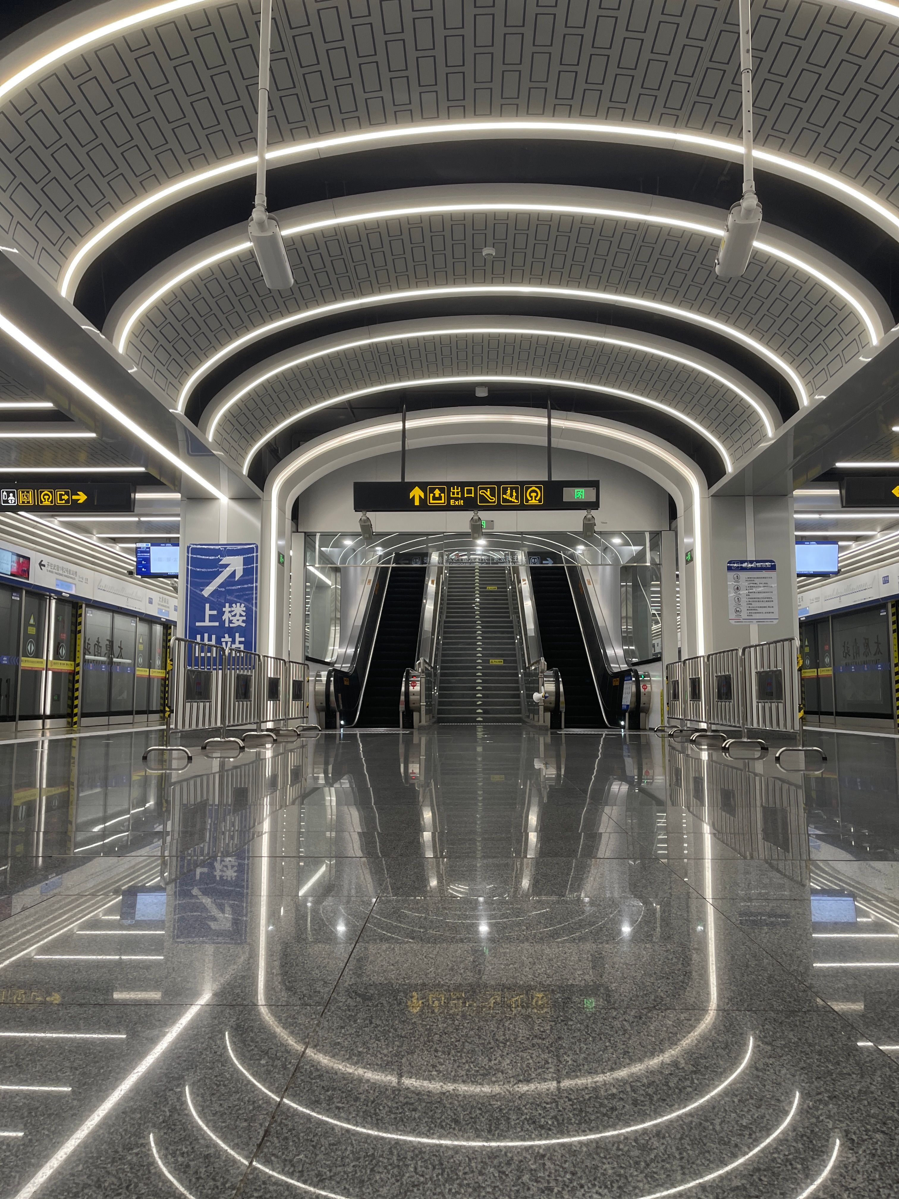 Modern Subway Station Interior with Escalators · Free Stock Photo