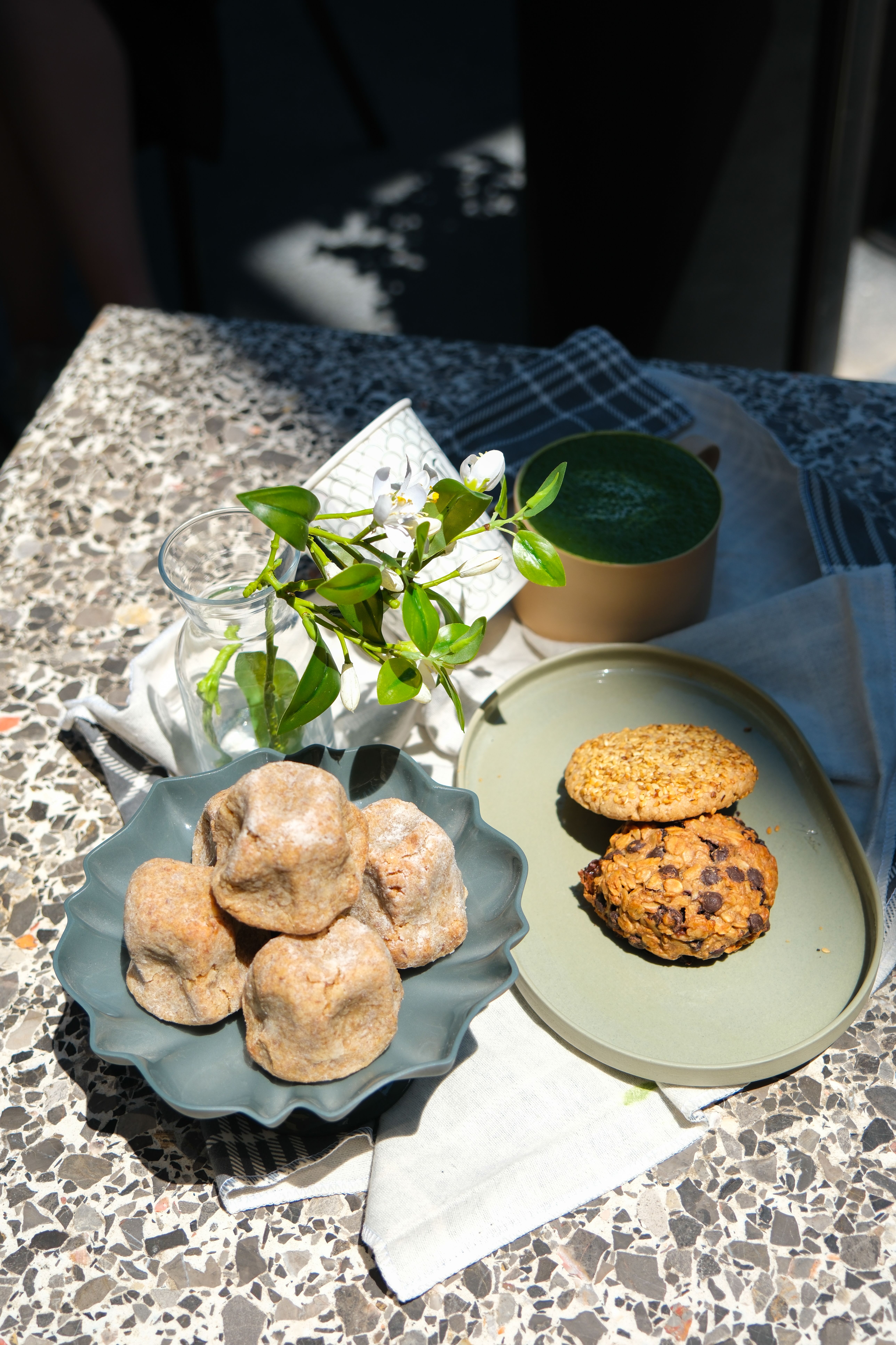 Elegant Cafe Table Setting with Cookies and Tea · Free Stock Photo