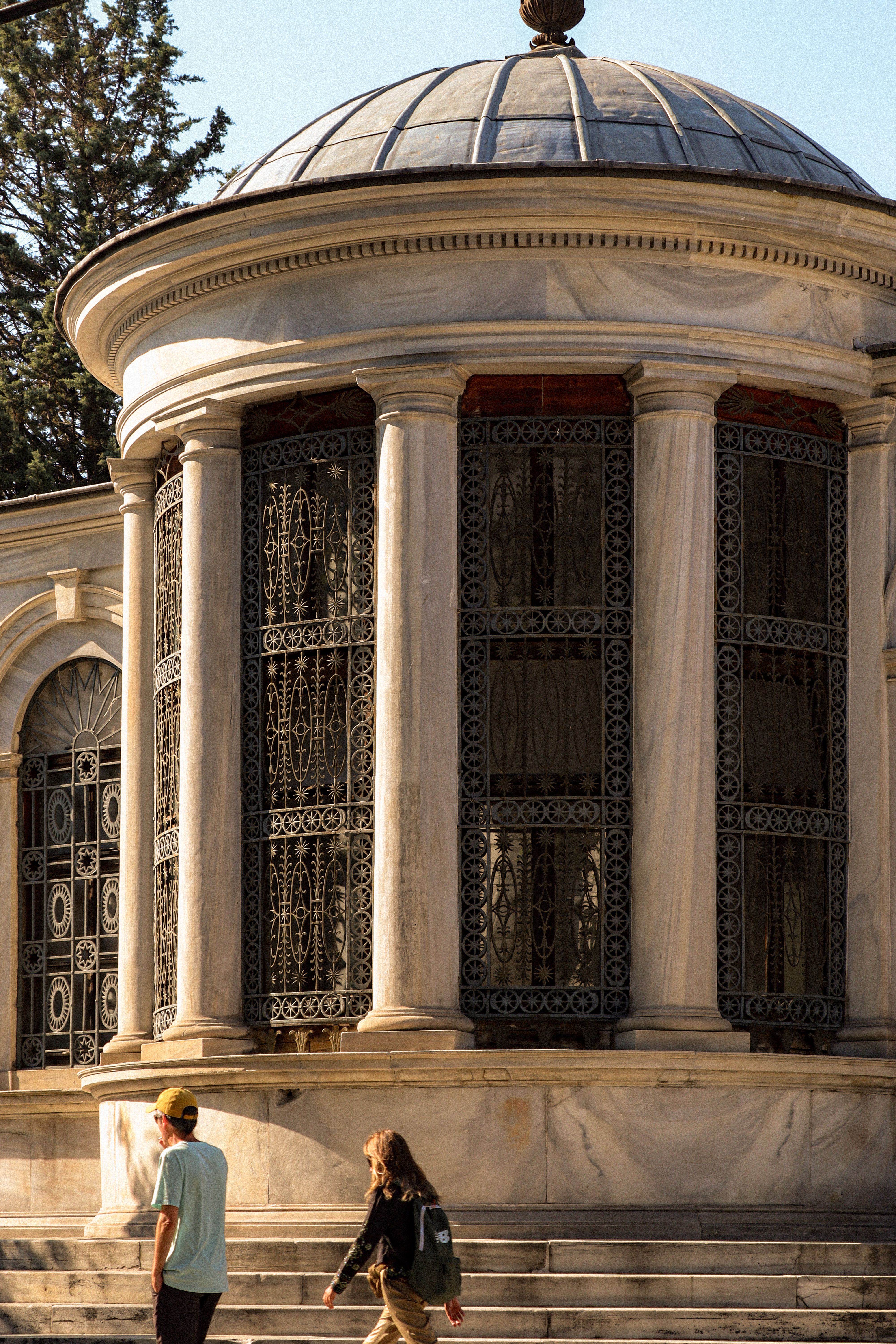 Historic Marble Building with Ornate Ironwork · Free Stock Photo