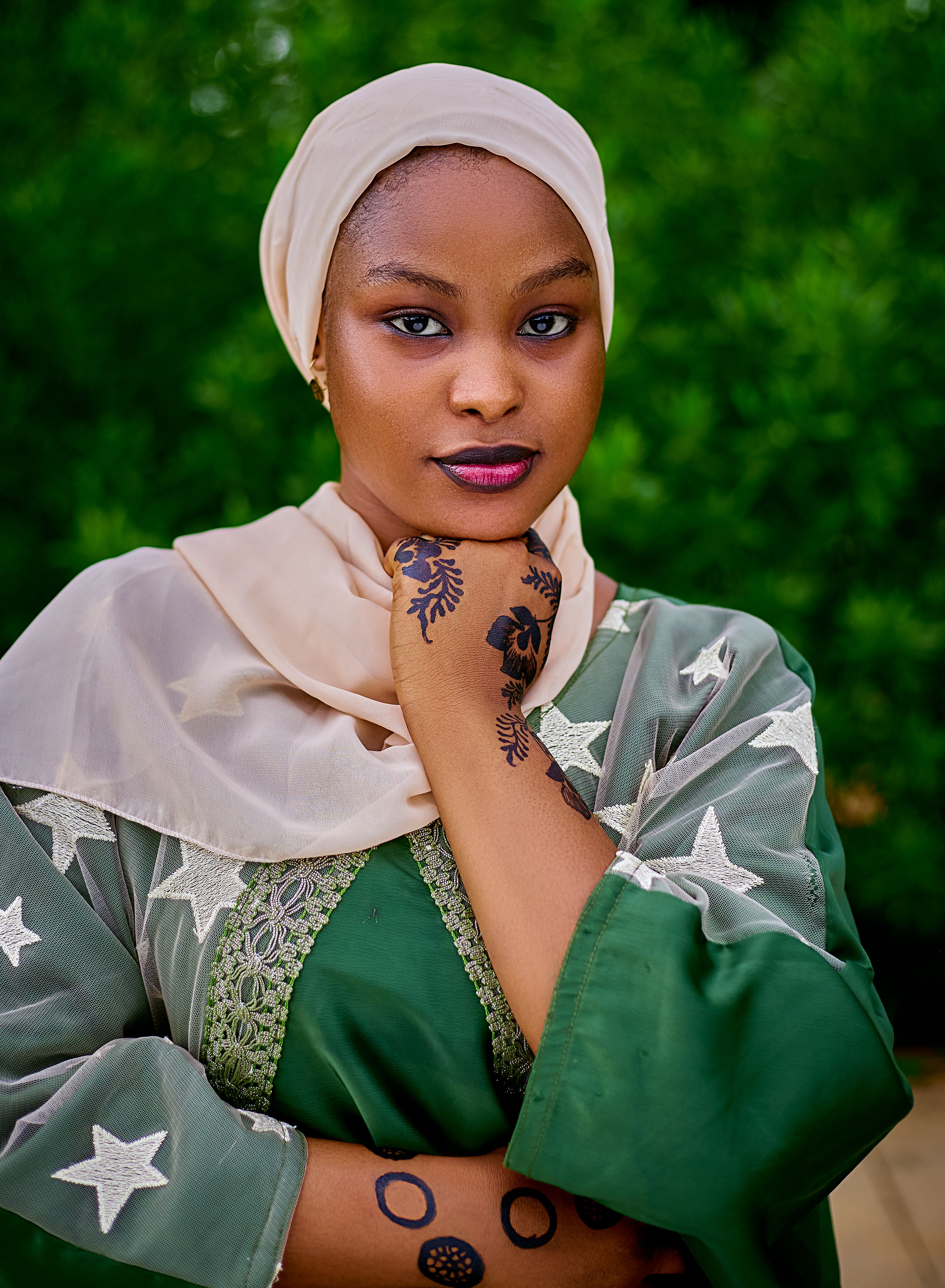Elegant Portrait of Woman with Henna and Hijab · Free Stock Photo