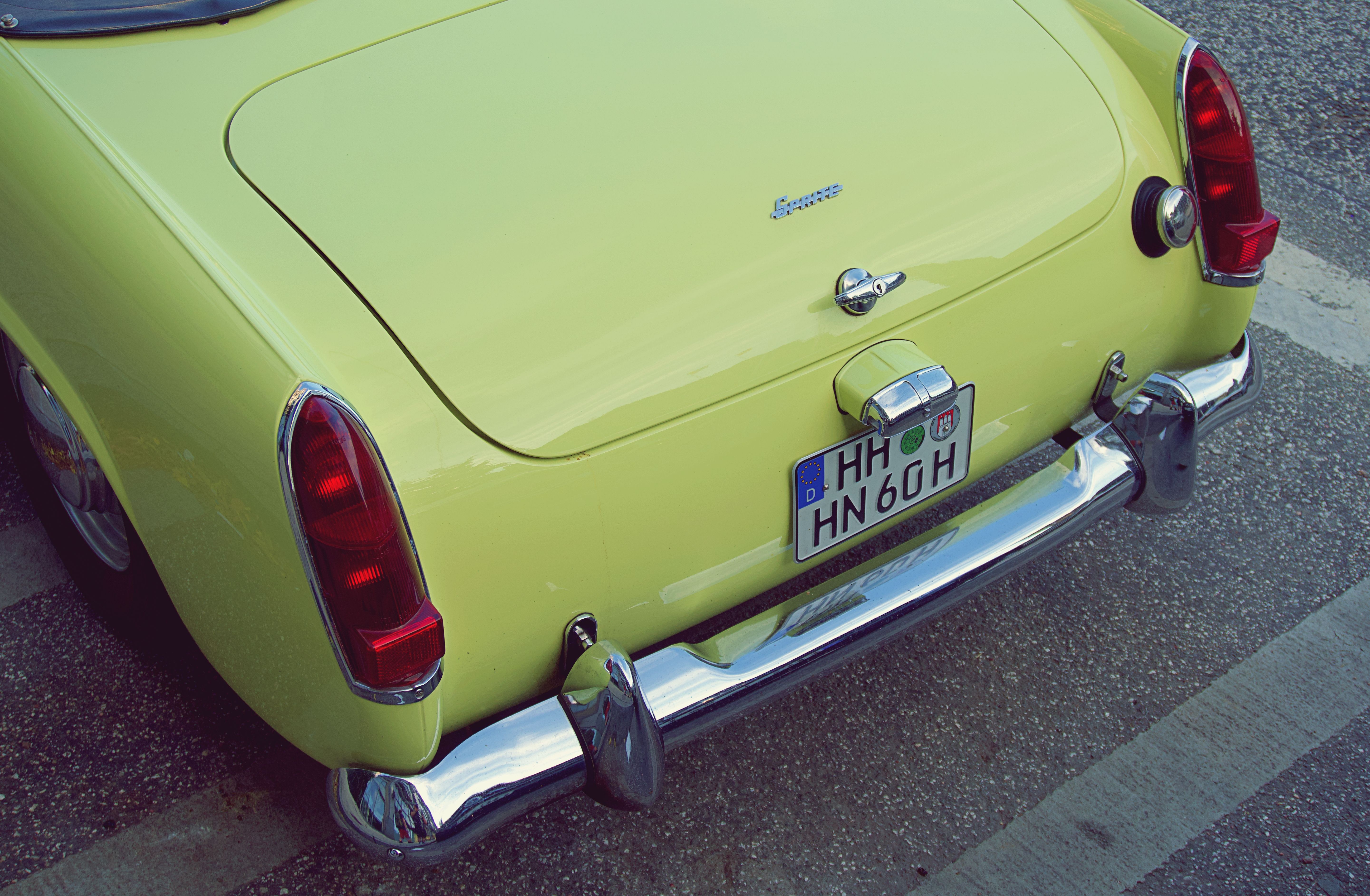 Vintage Yellow Car with European License Plate · Free Stock Photo