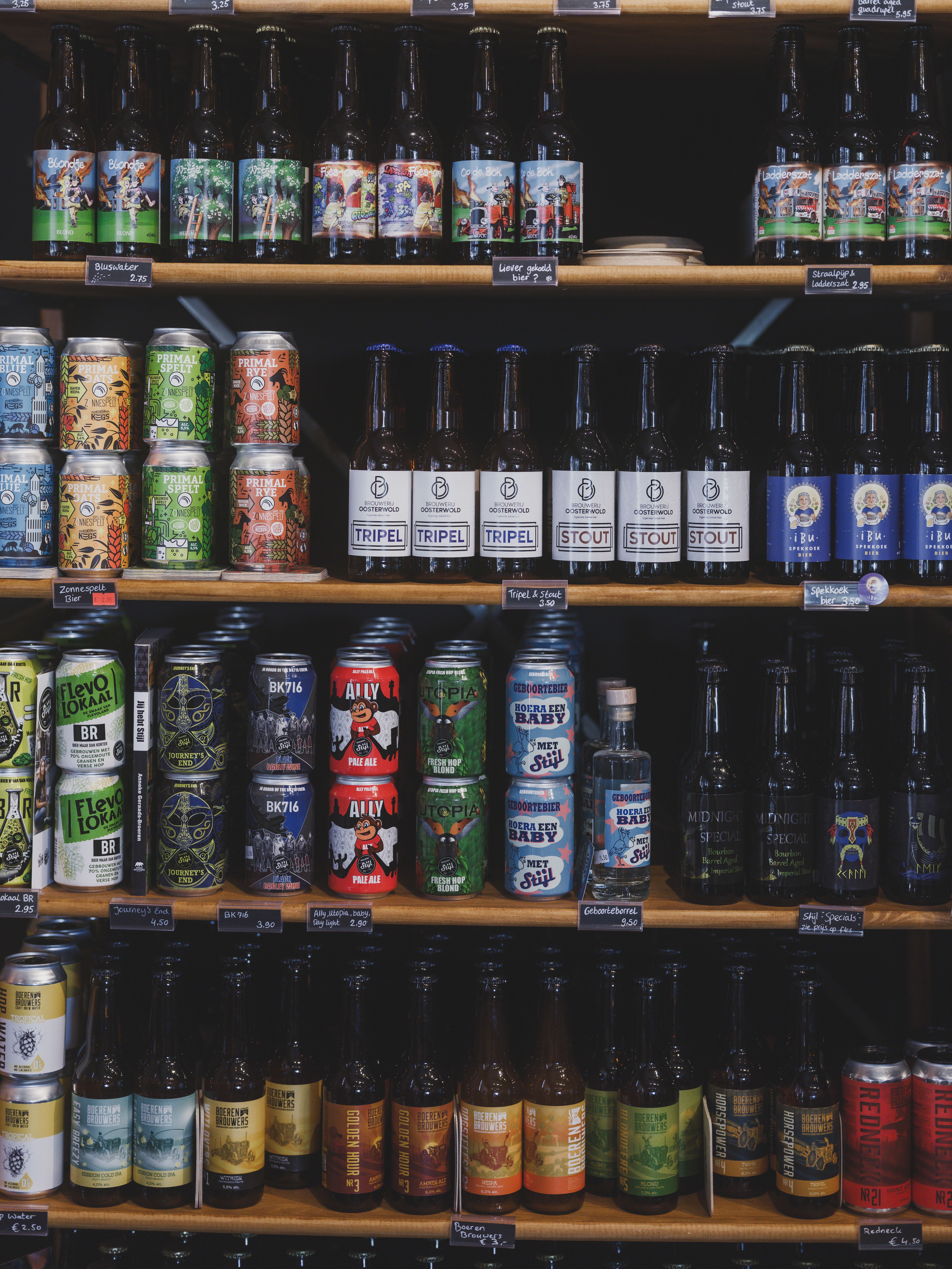 Assorted Craft Beer Display on Store Shelves · Free Stock Photo