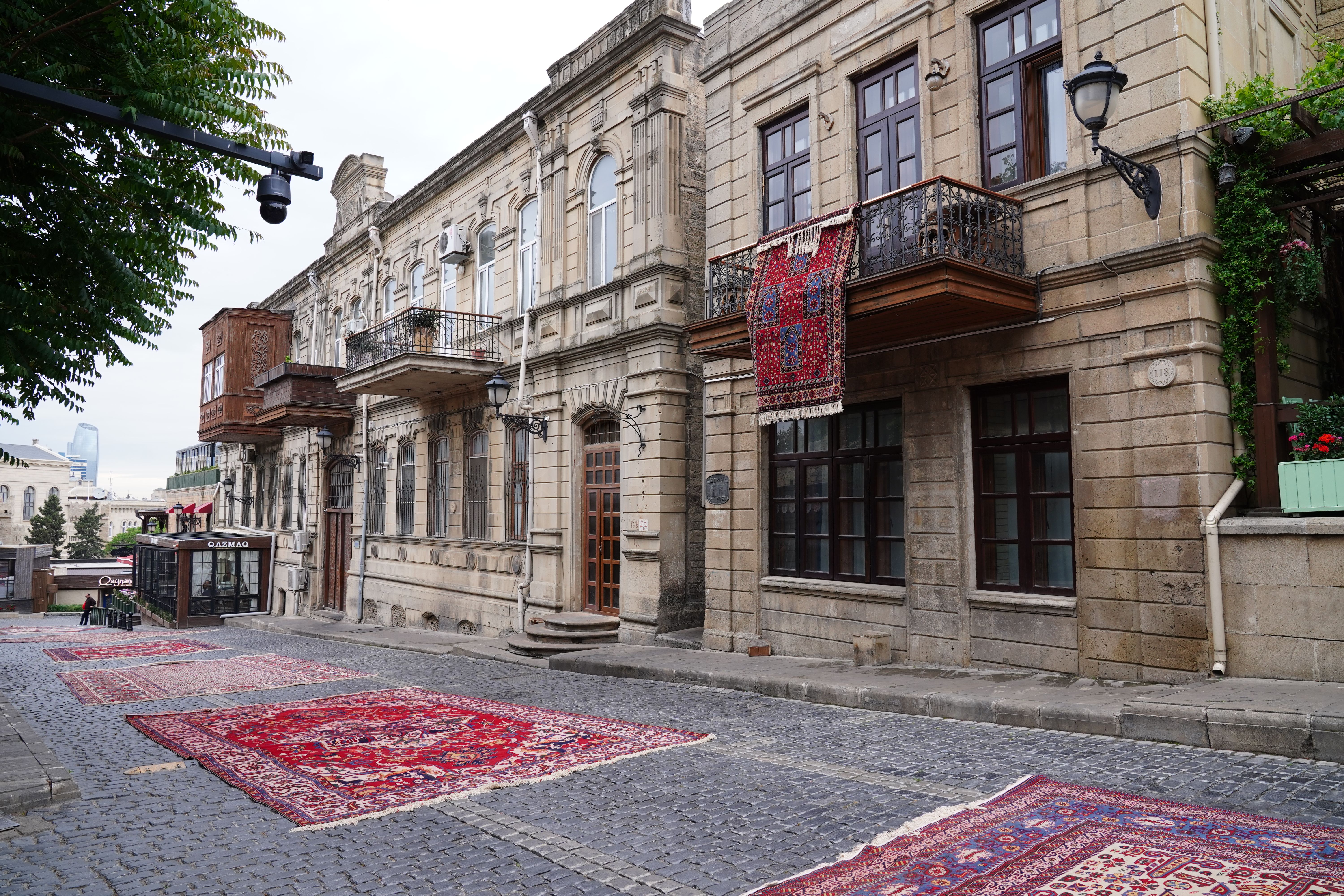 Historic Street with Traditional Carpets in Baku · Free Stock Photo