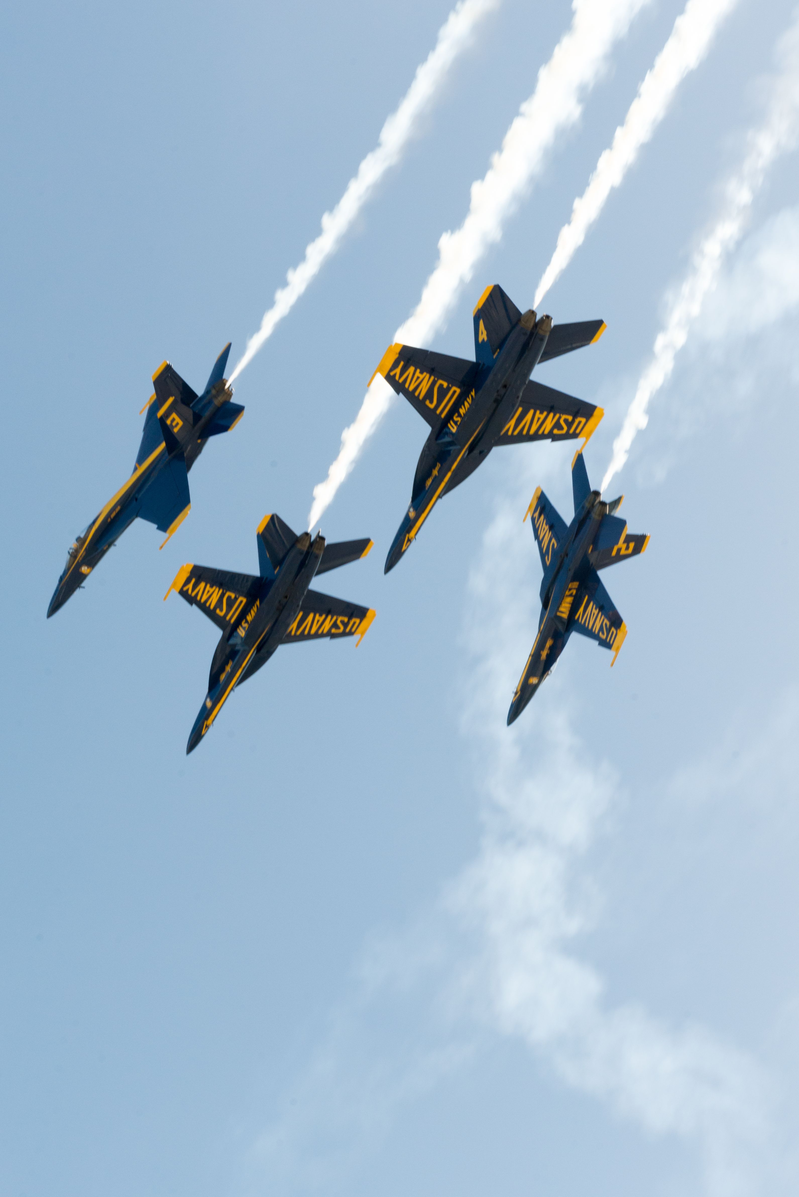 Blue and Yellow Jet Plane in Mid Air · Free Stock Photo