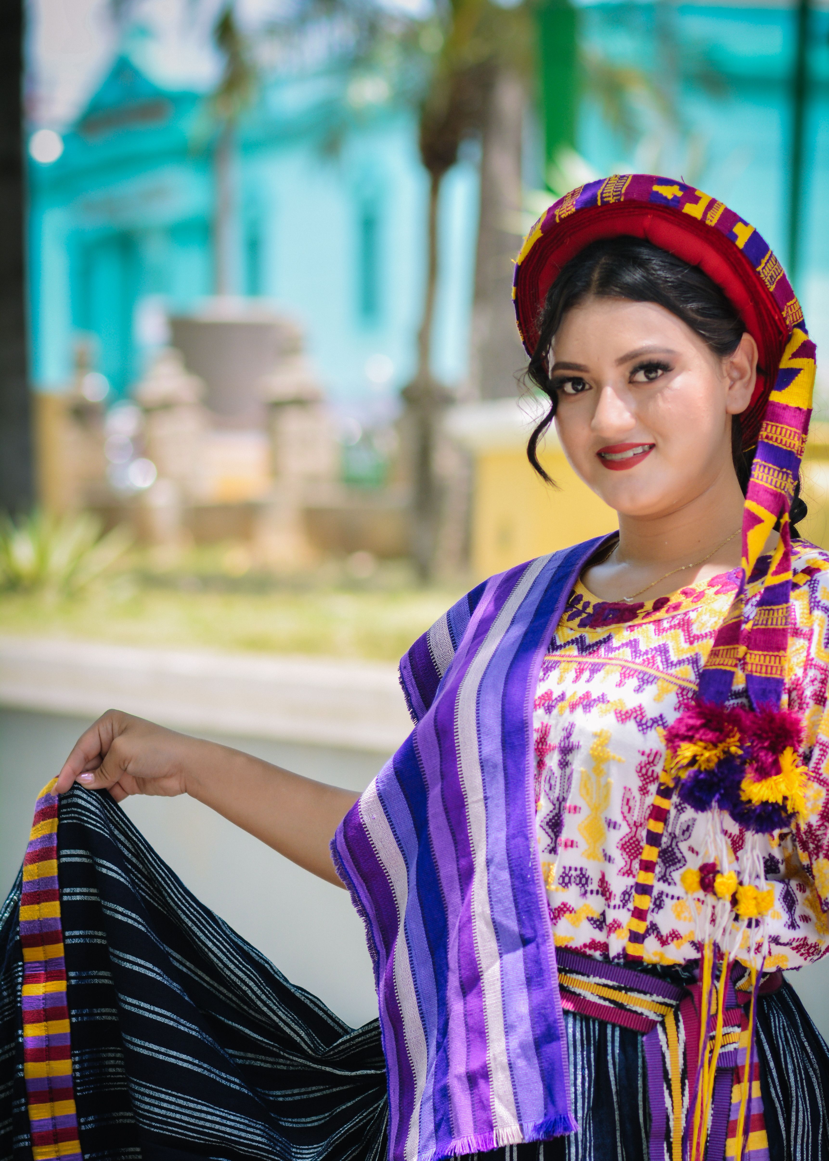 Woman in Traditional Colorful Attire Outdoors · Free Stock Photo