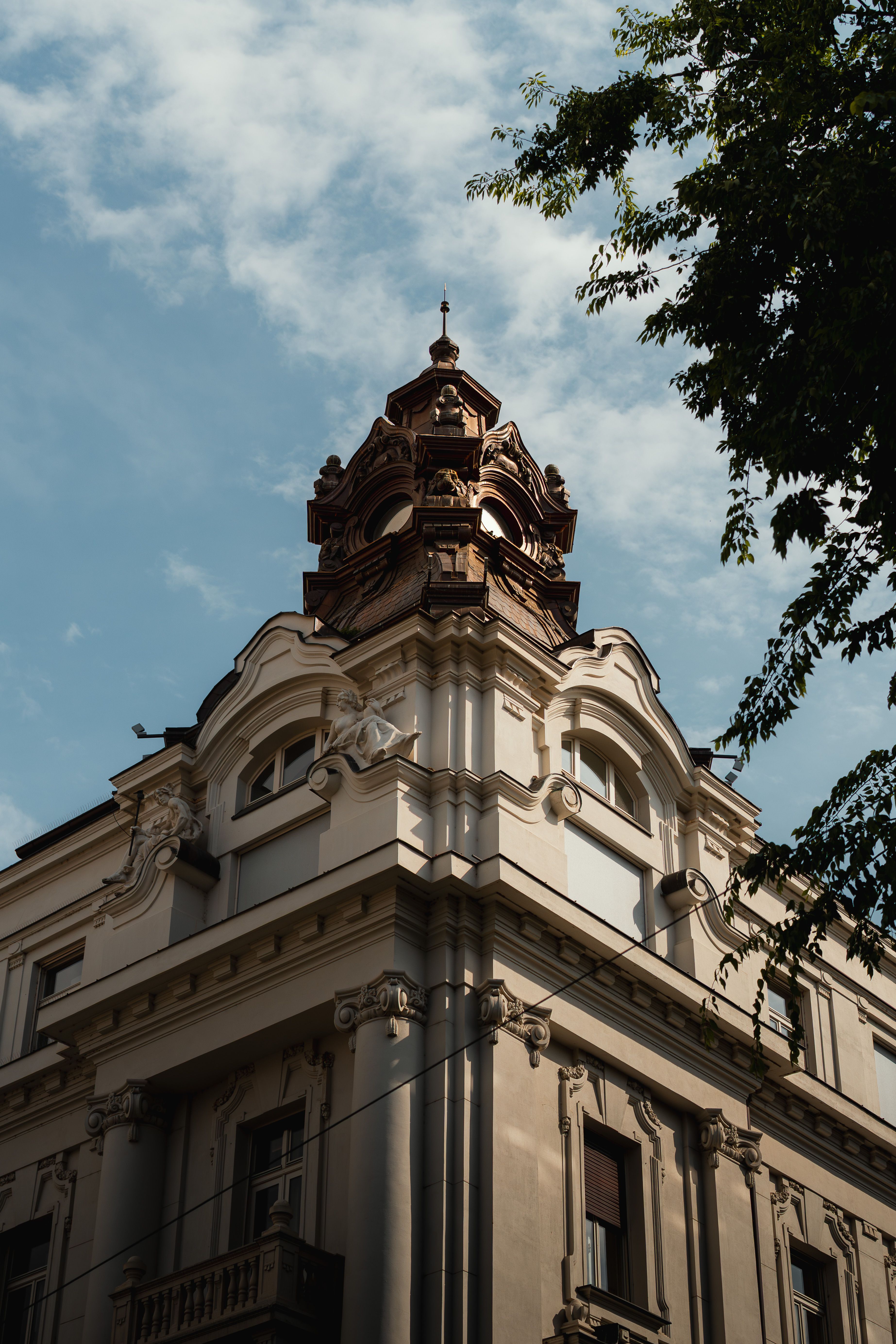 Elegant Historic Building with Ornate Tower · Free Stock Photo