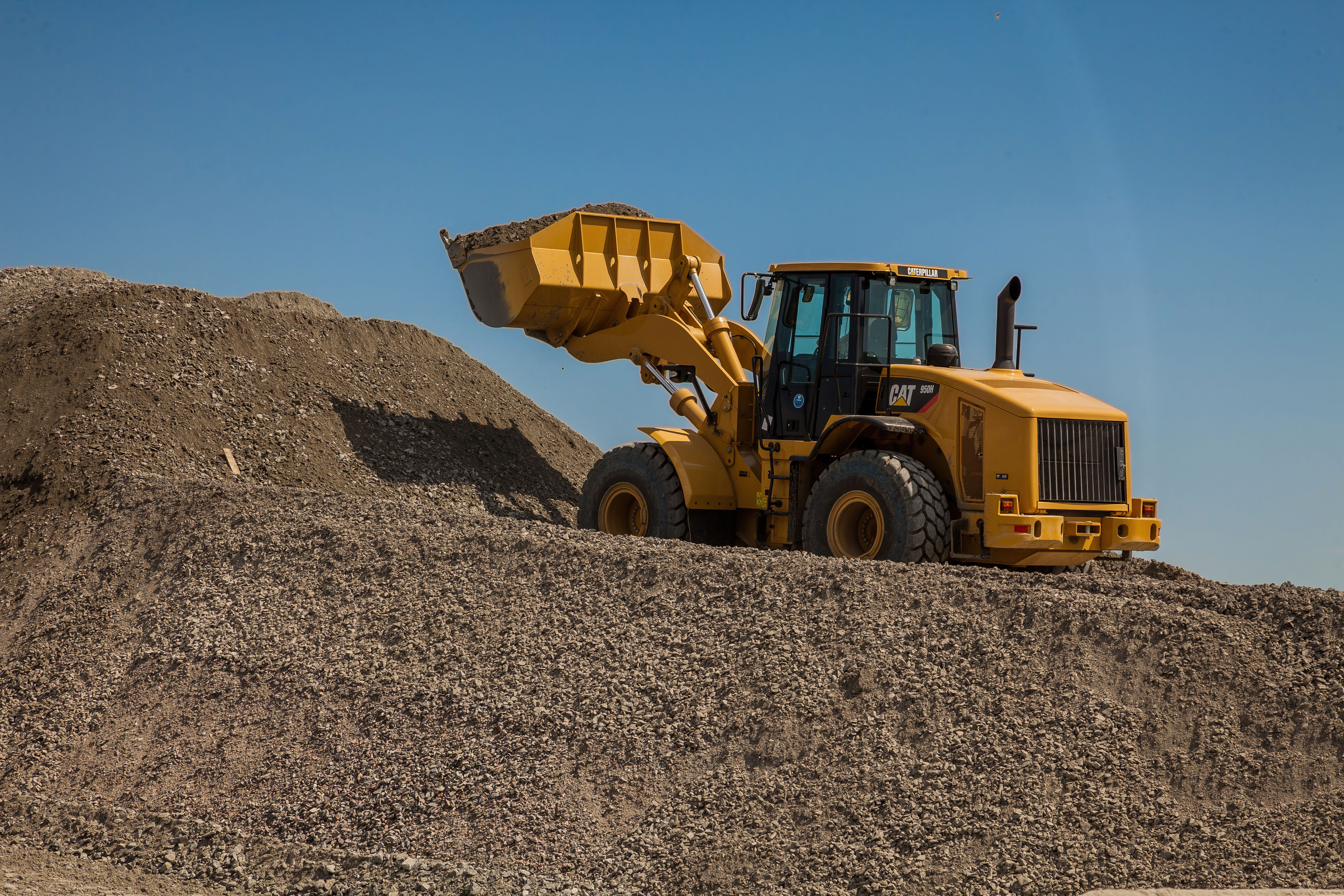 Heavy Machinery in Construction Site with Blue Sky · Free Stock Photo