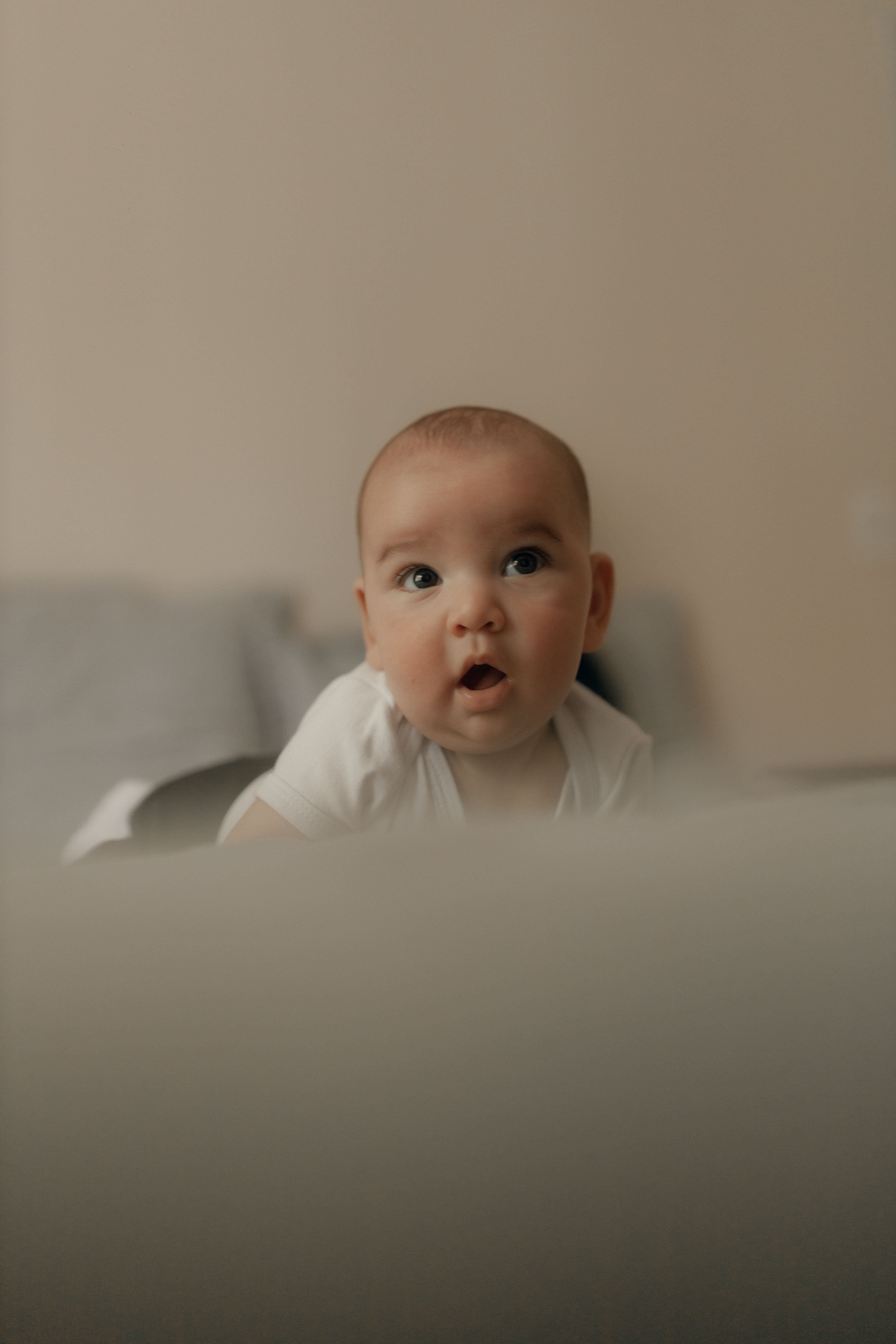 Adorable Baby Portrait with Curious Expression · Free Stock Photo