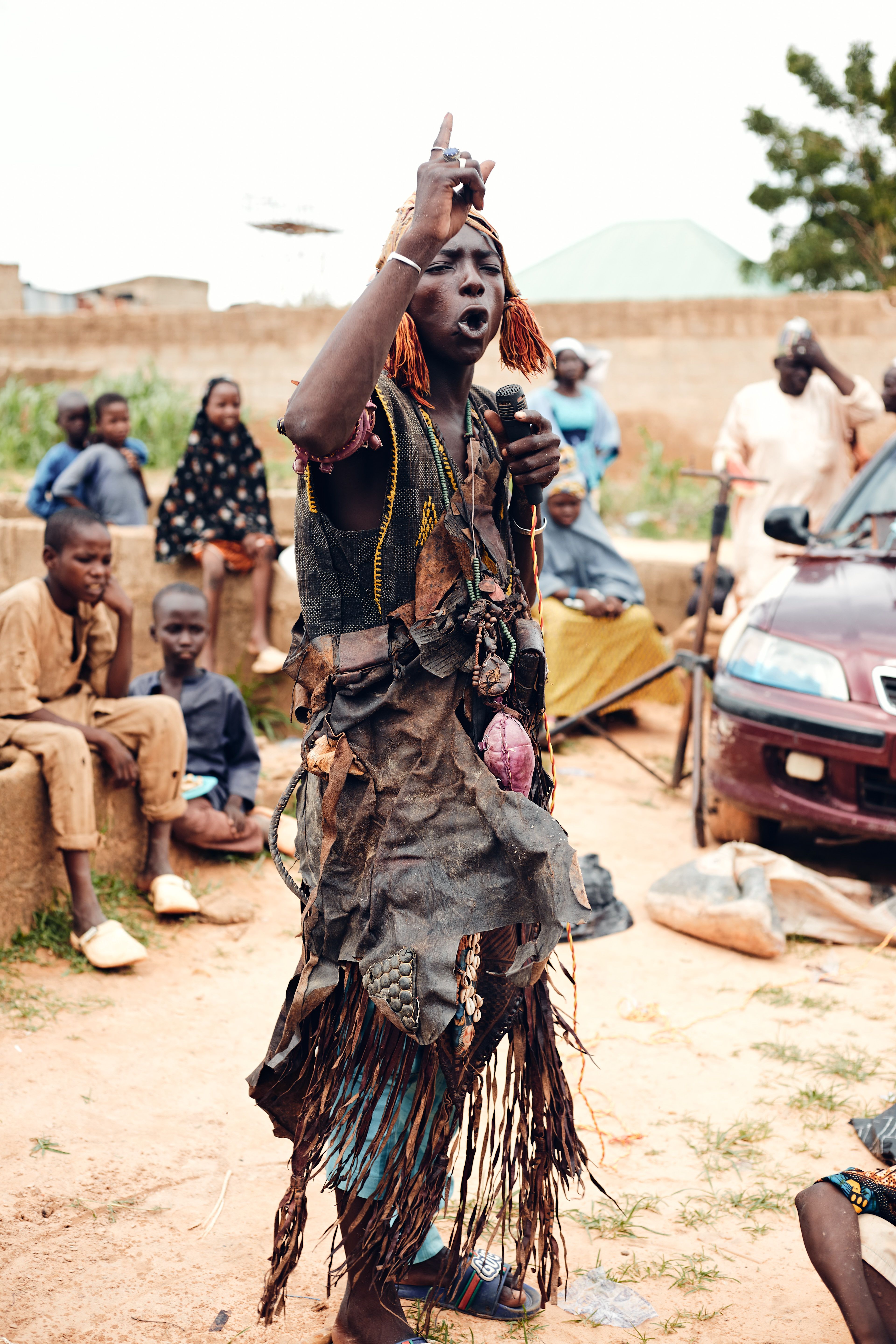 Traditional Performer Captivating Outdoor Audience · Free Stock Photo